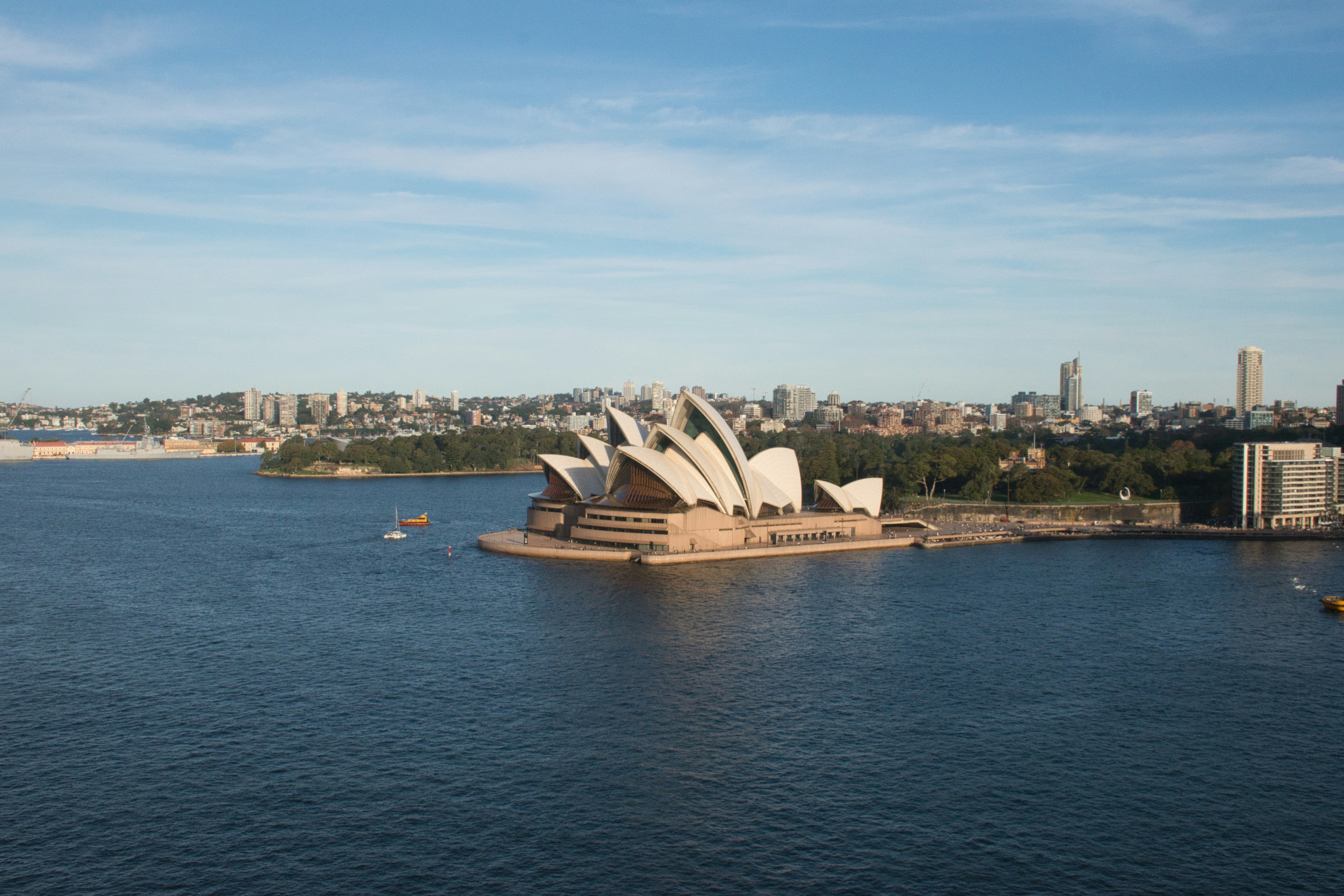 The sydney opera house sits on the harbor. photo – Free City Image on ...