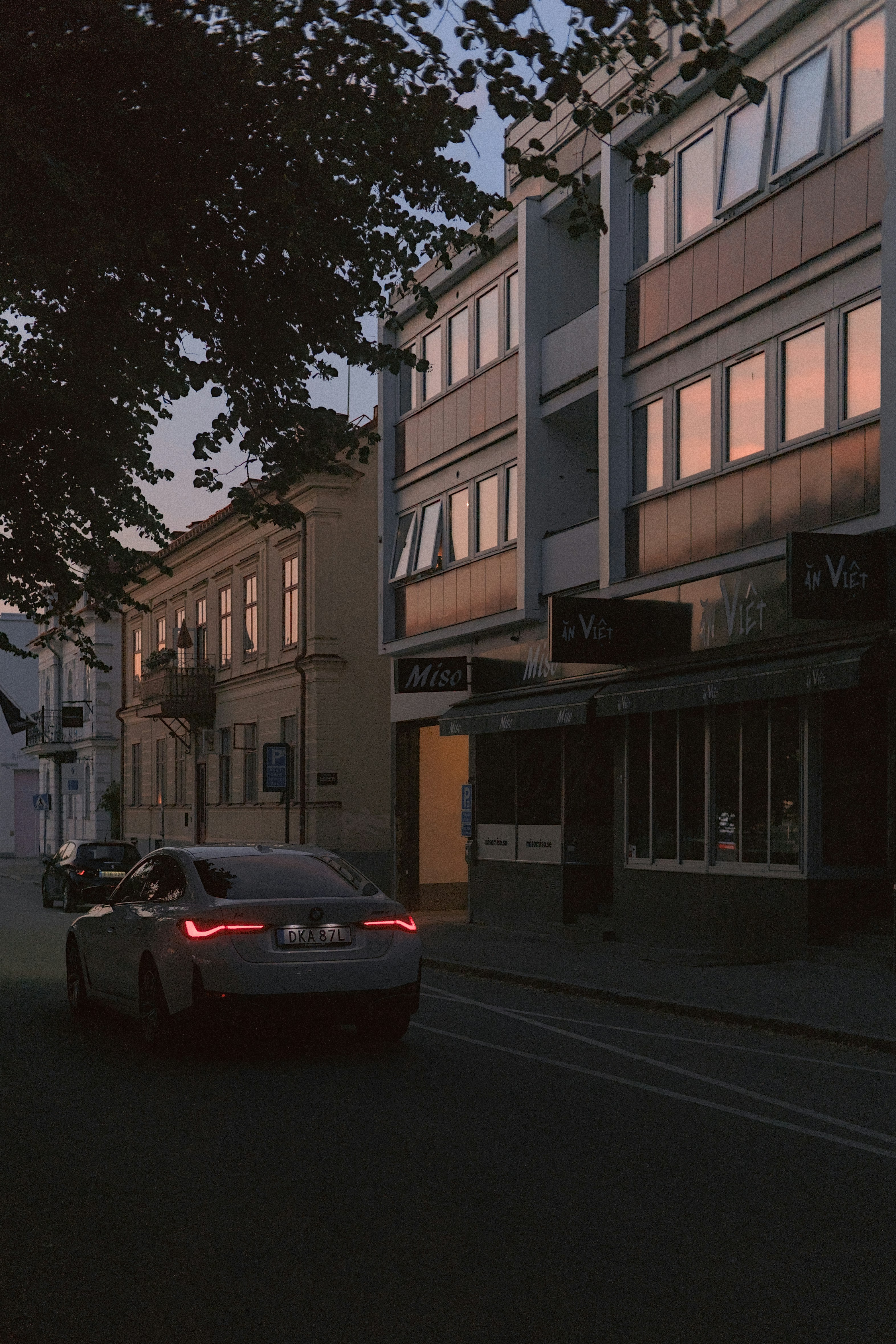 Twilight Reflections on Urban Facades