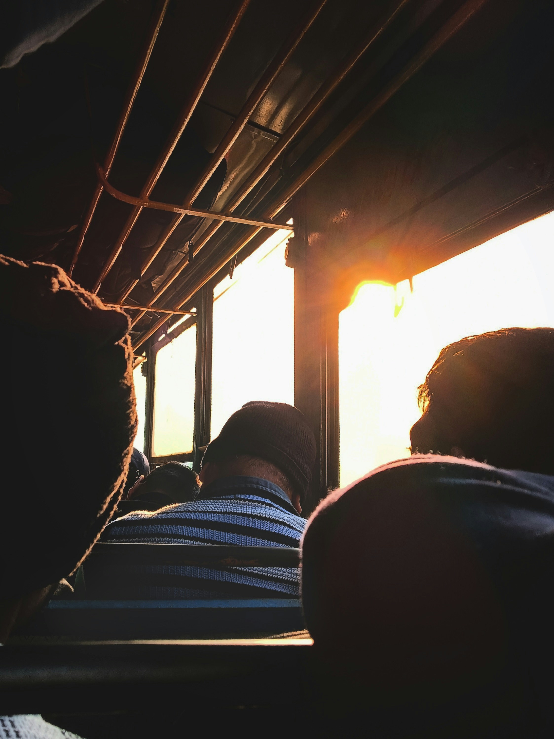 People are inside of a bus, watching the sunset. photo – Free Travel ...