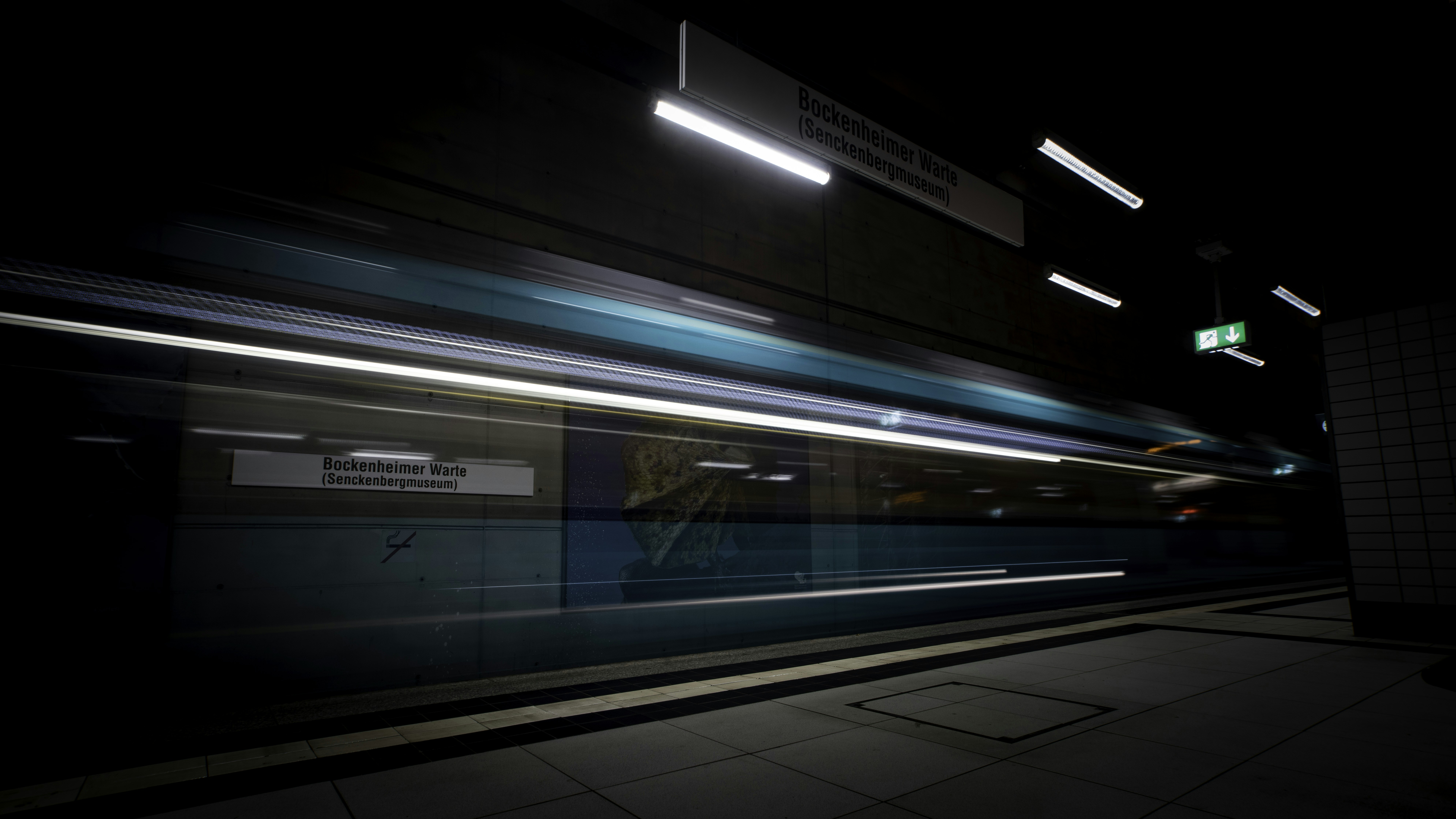 A train speeds through a dark subway station. photo – Free Architecture ...