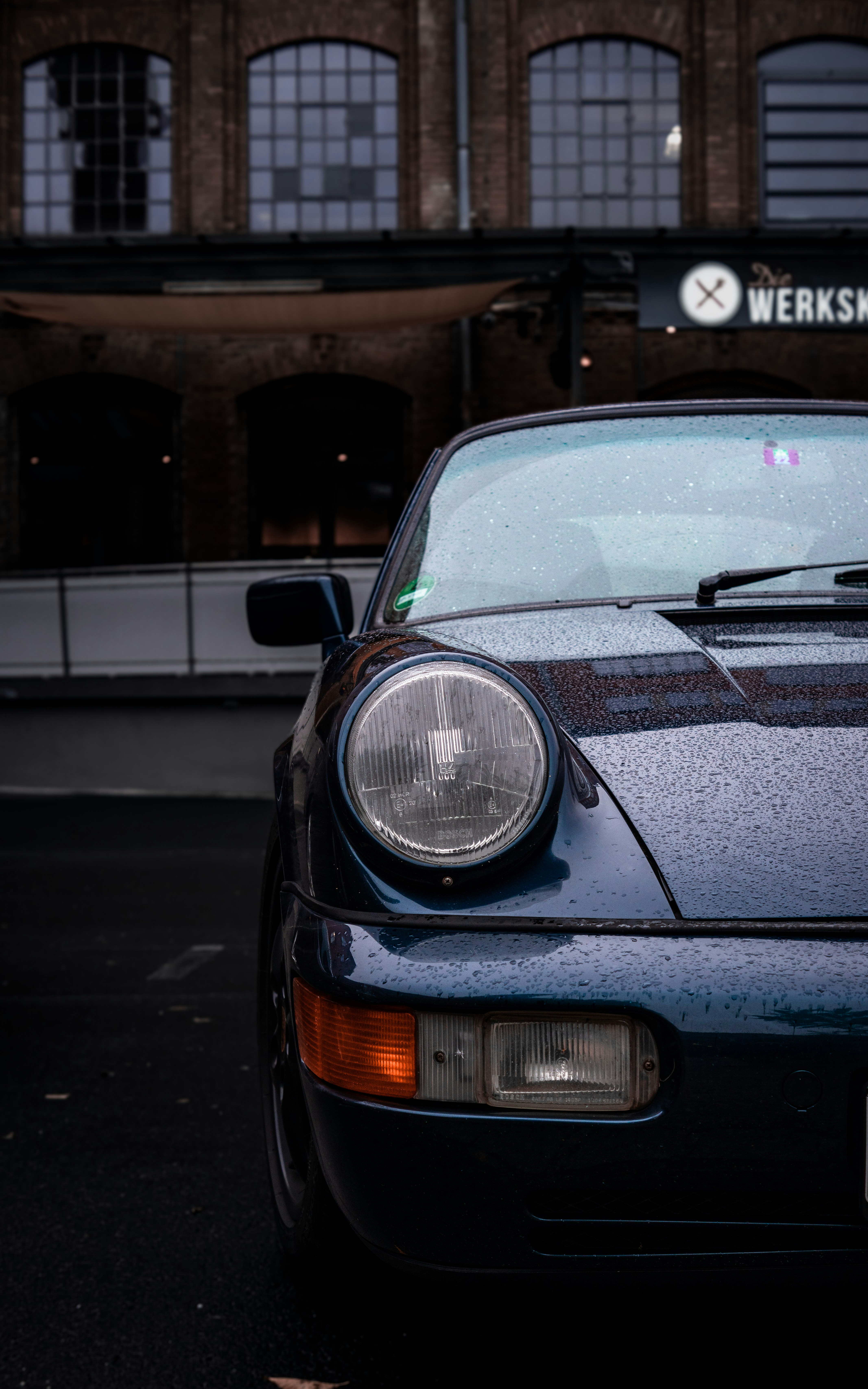 Elegance in the Rain: A Classic Porsche Encounter
