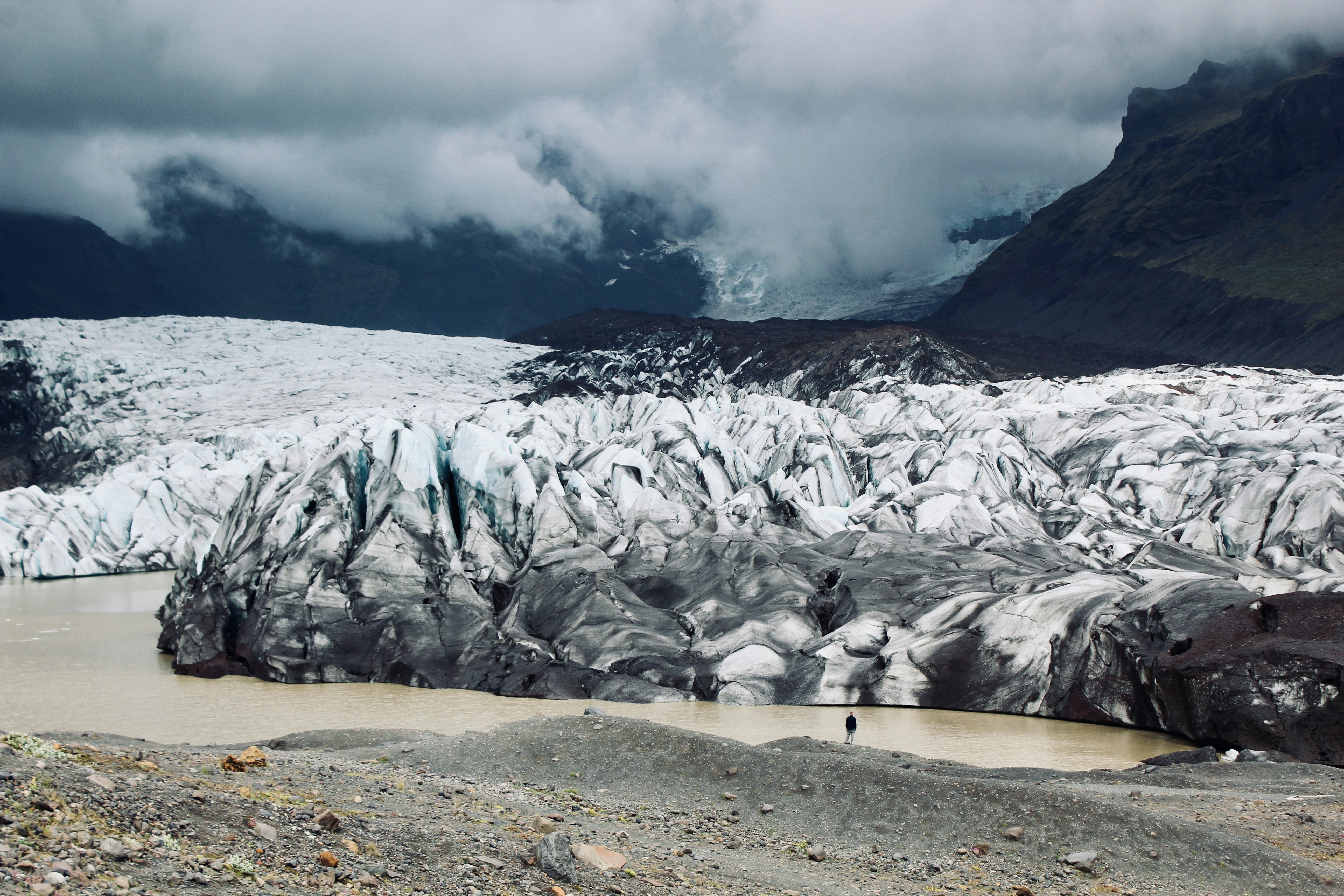 SOLHEIMAJOKULL | Glacier landscape under a cloudy, overcast sky.