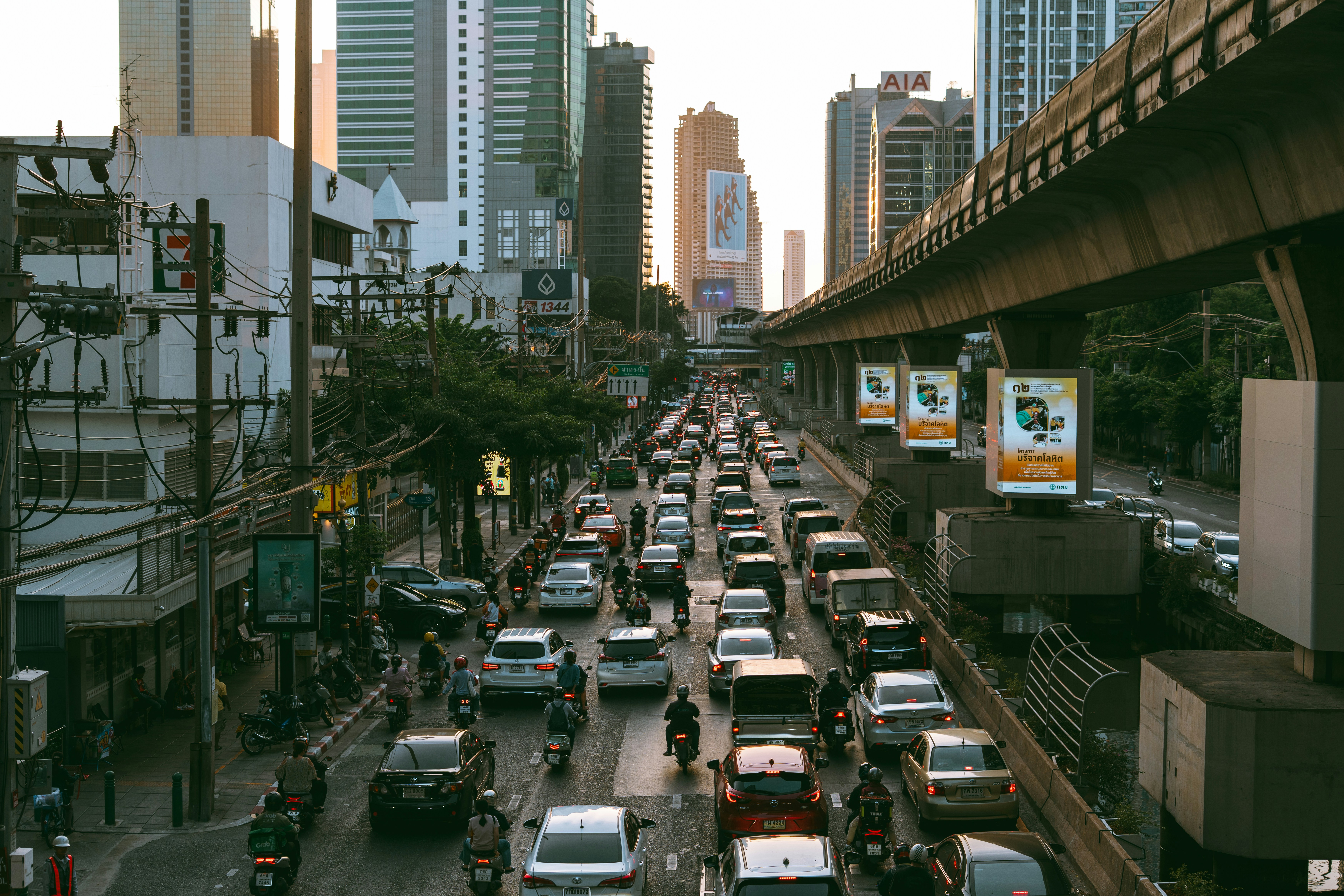 Traffic congestion fills a bustling city street.