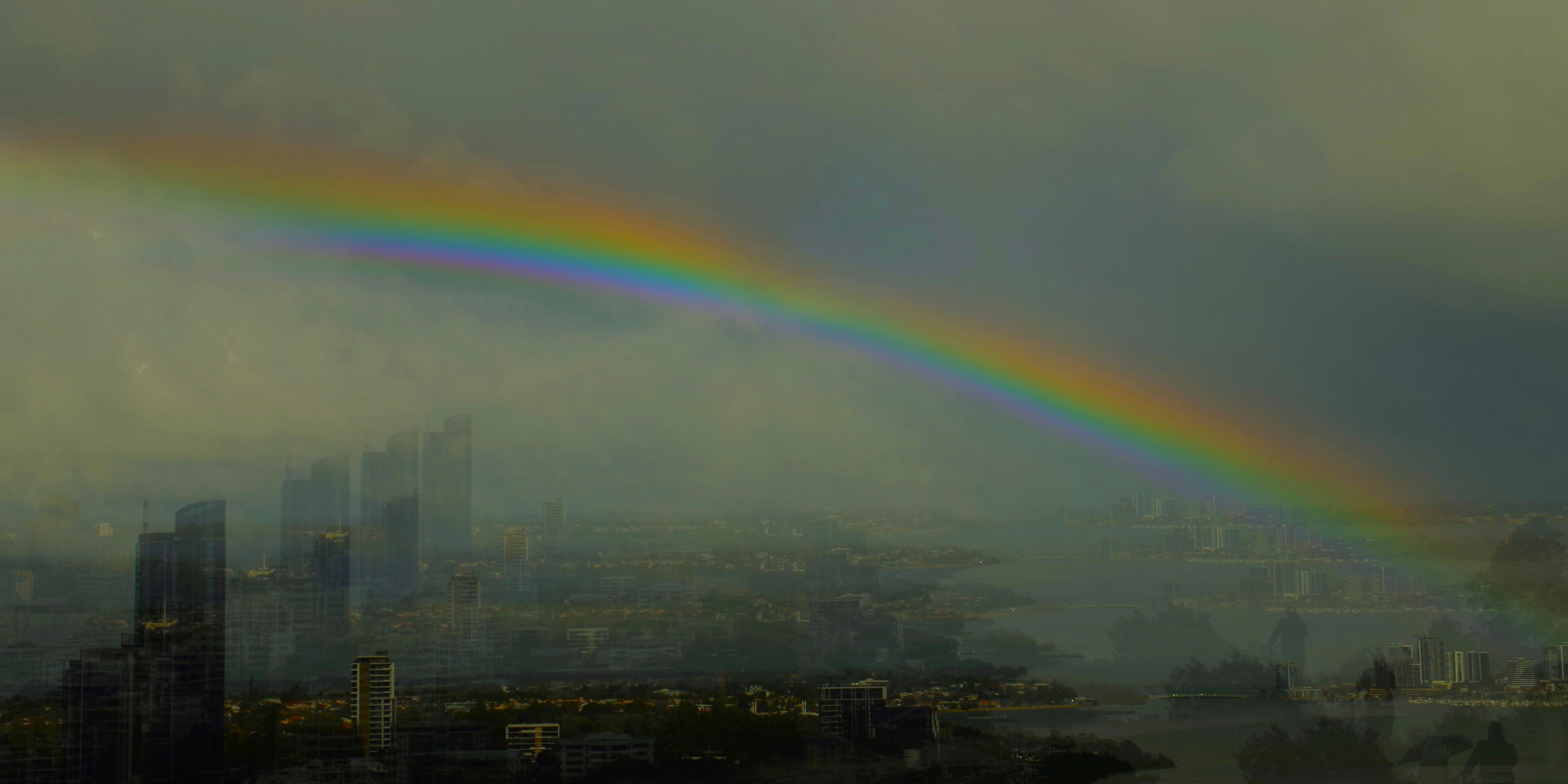 Veil of Color Over Urban Horizons