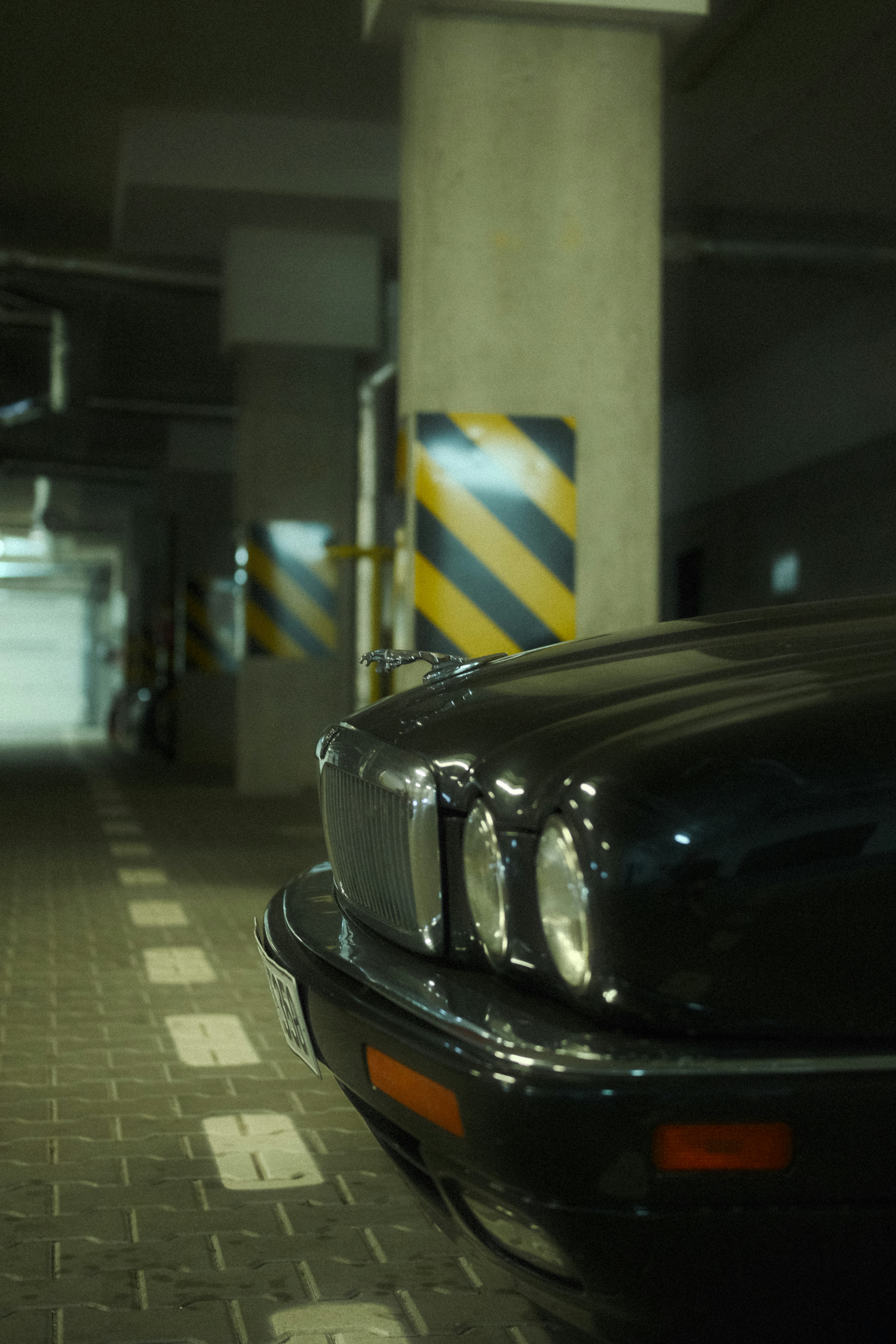 Elegance in Shadows: A Classic Car's Silent Presence