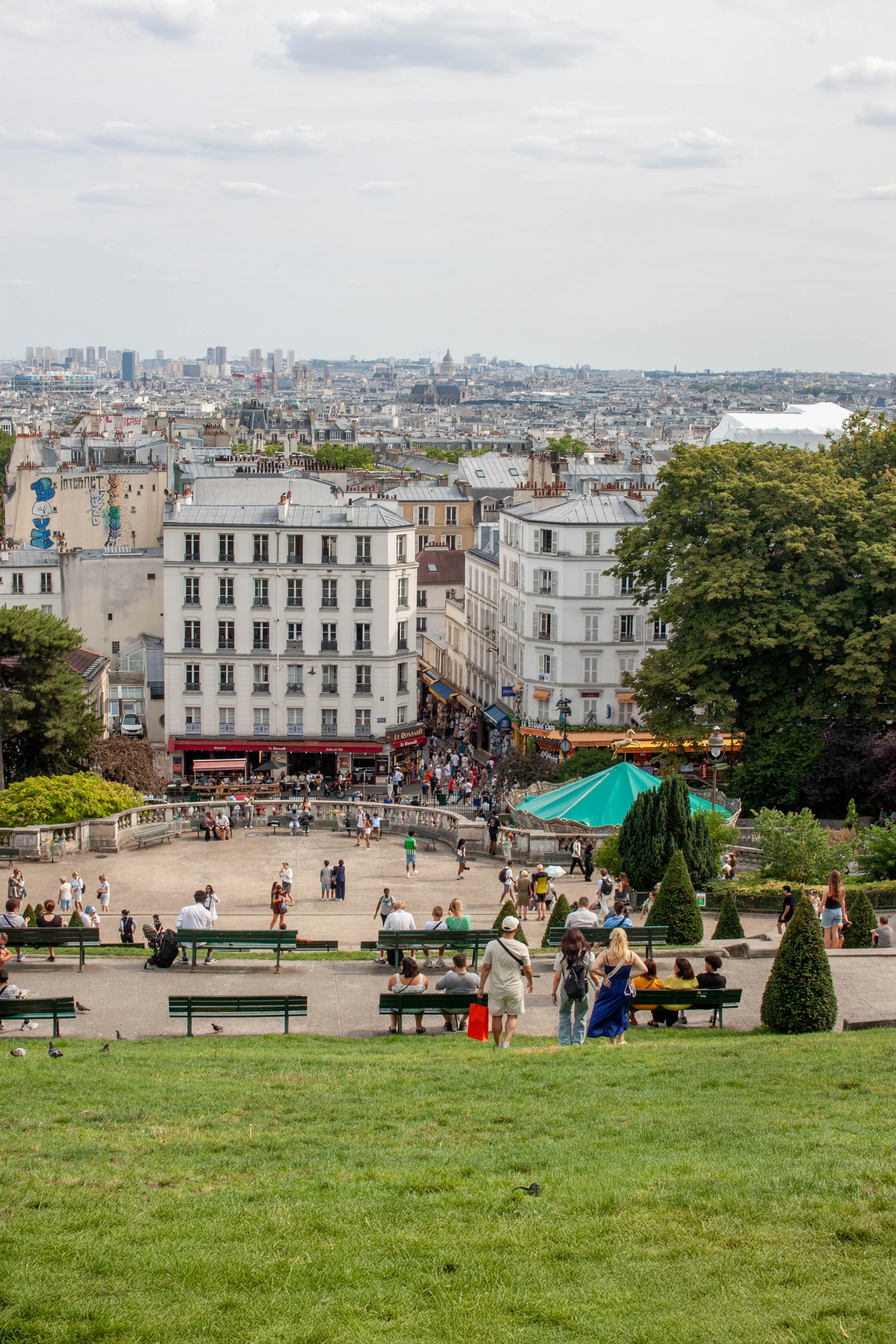 A scenic view of paris with people.