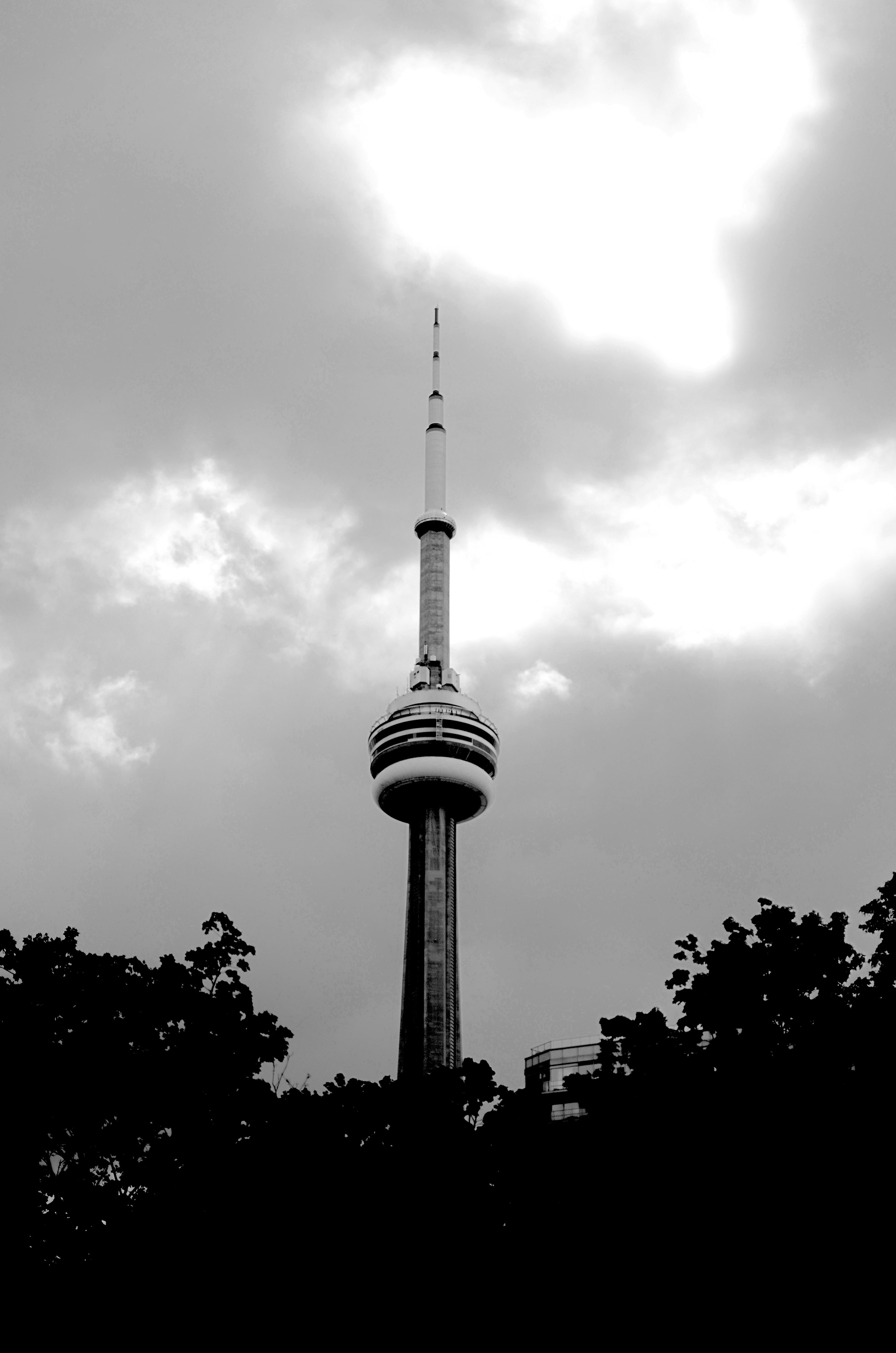 A Monochrome Tower Amidst the Clouds
