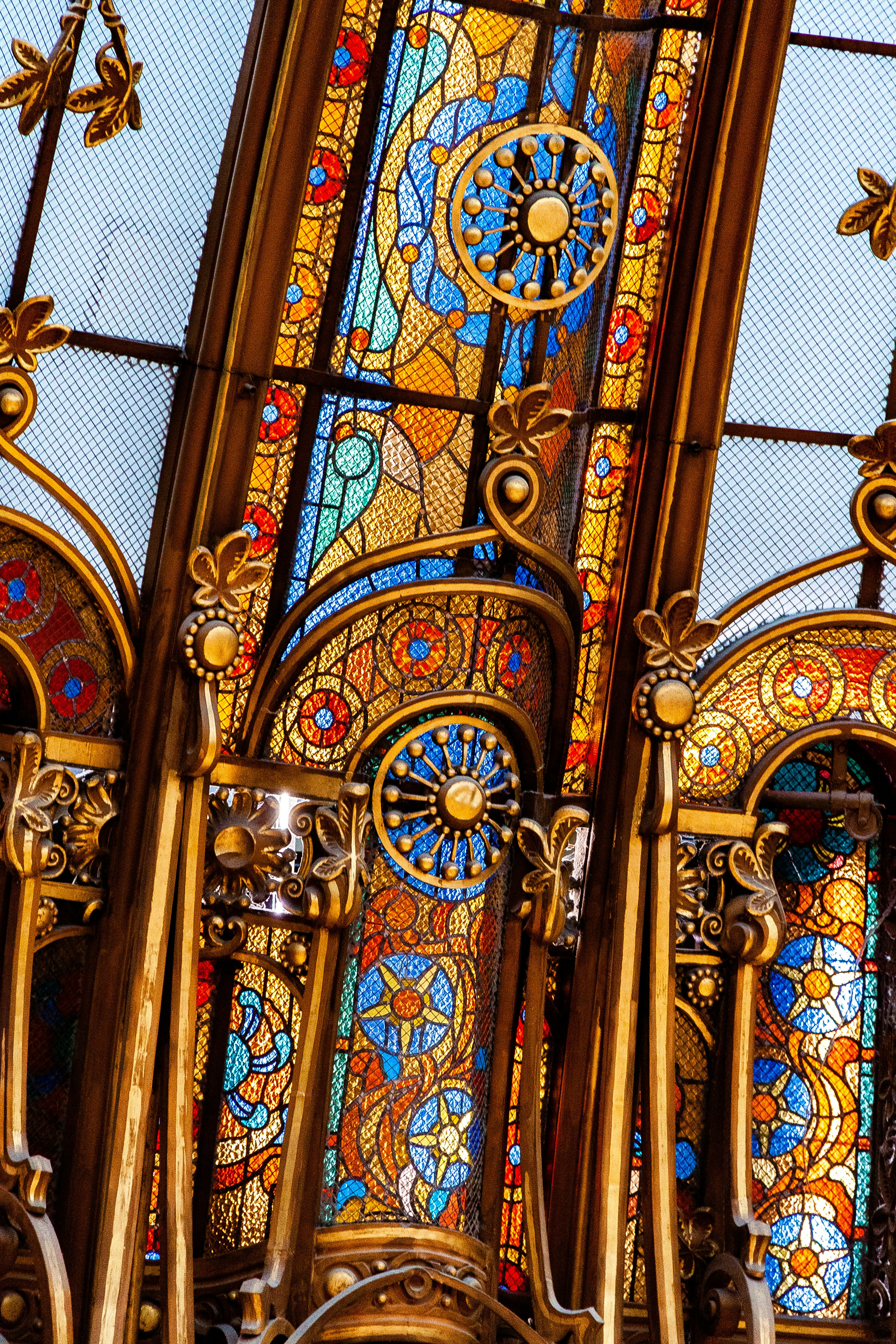 Stained glass window displays intricate details and patterns. photo ...
