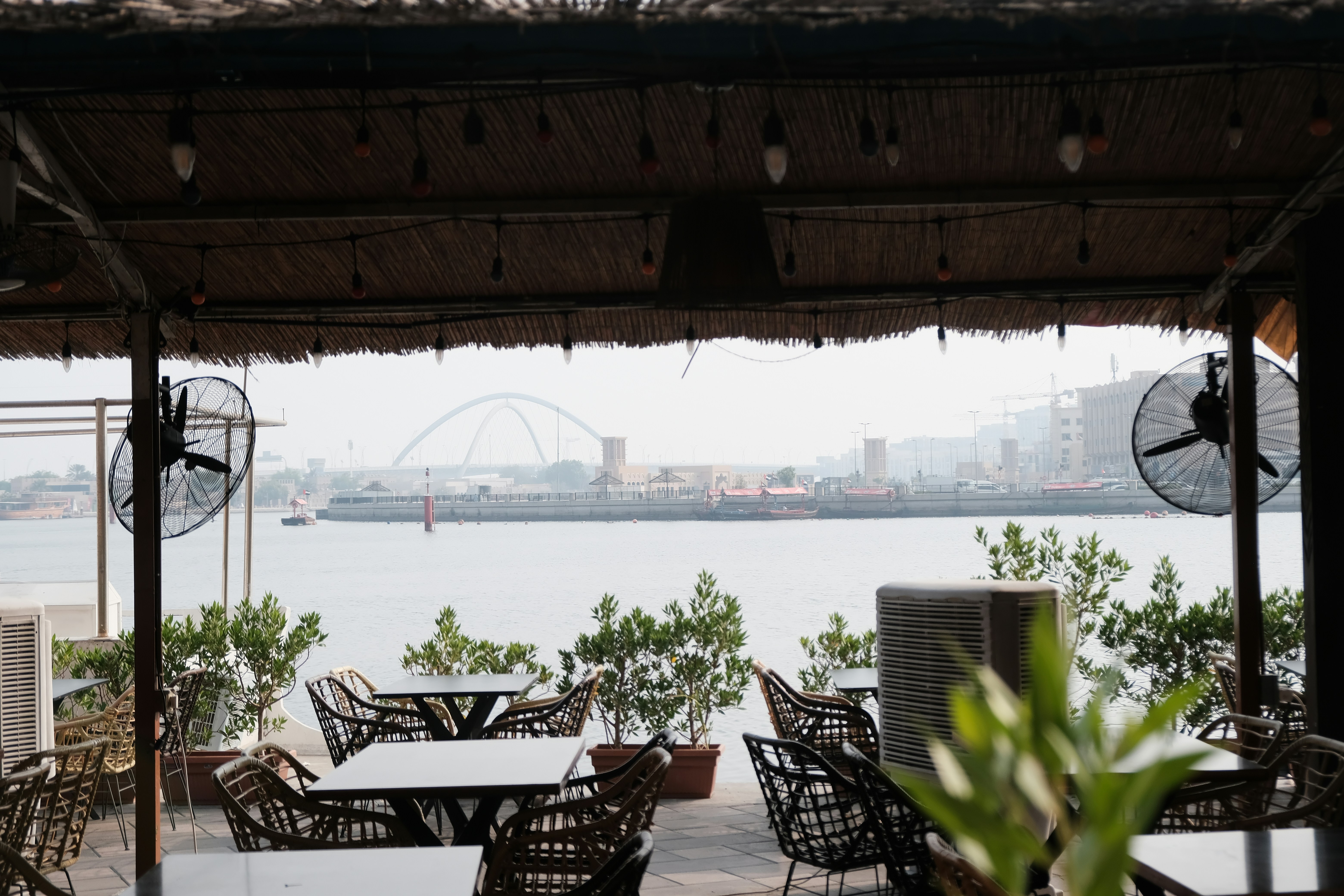 A restaurant overlooks a beautiful cityscape.