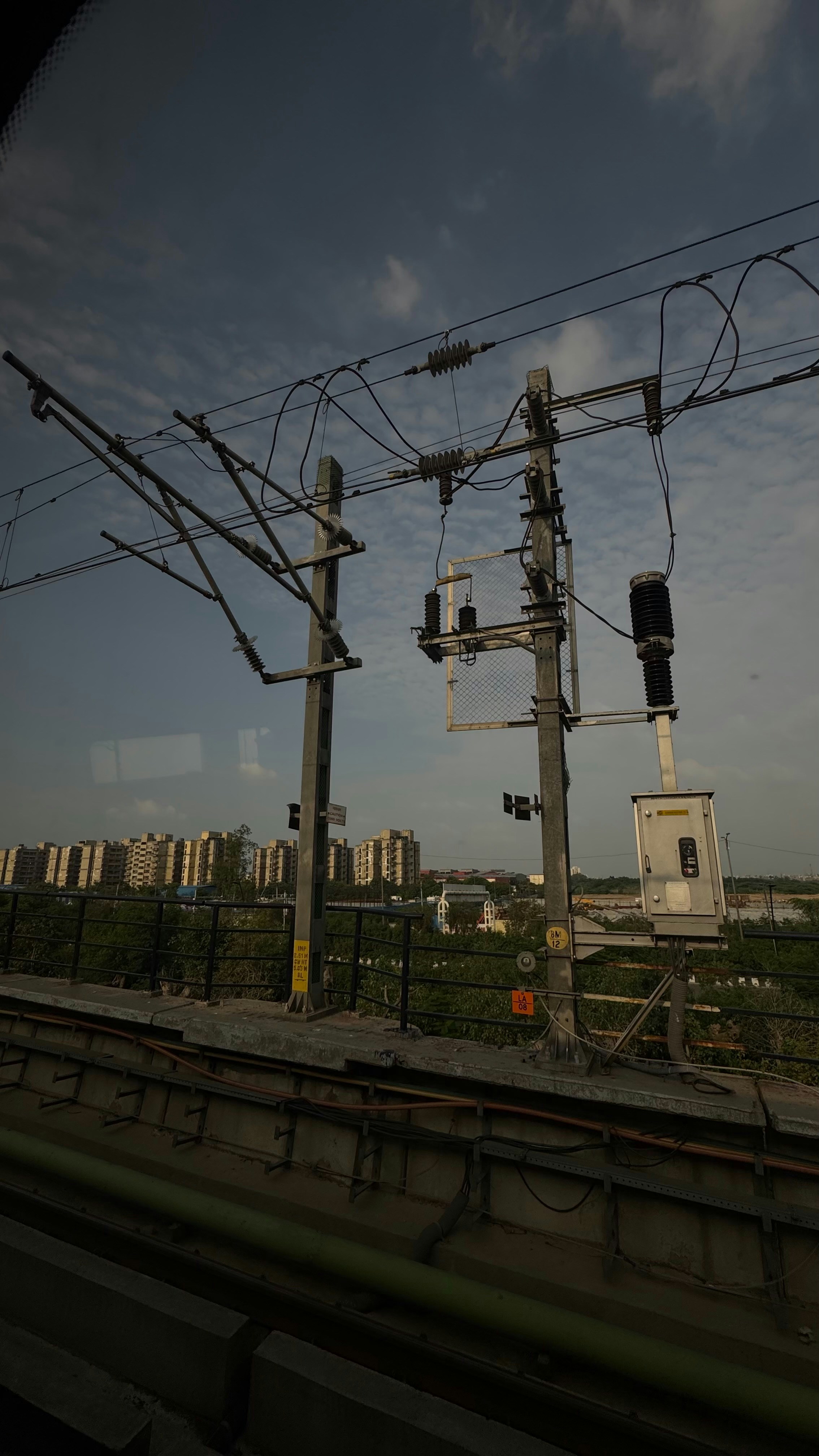 Dehi metro | Railway tracks and electrical infrastructure are shown.