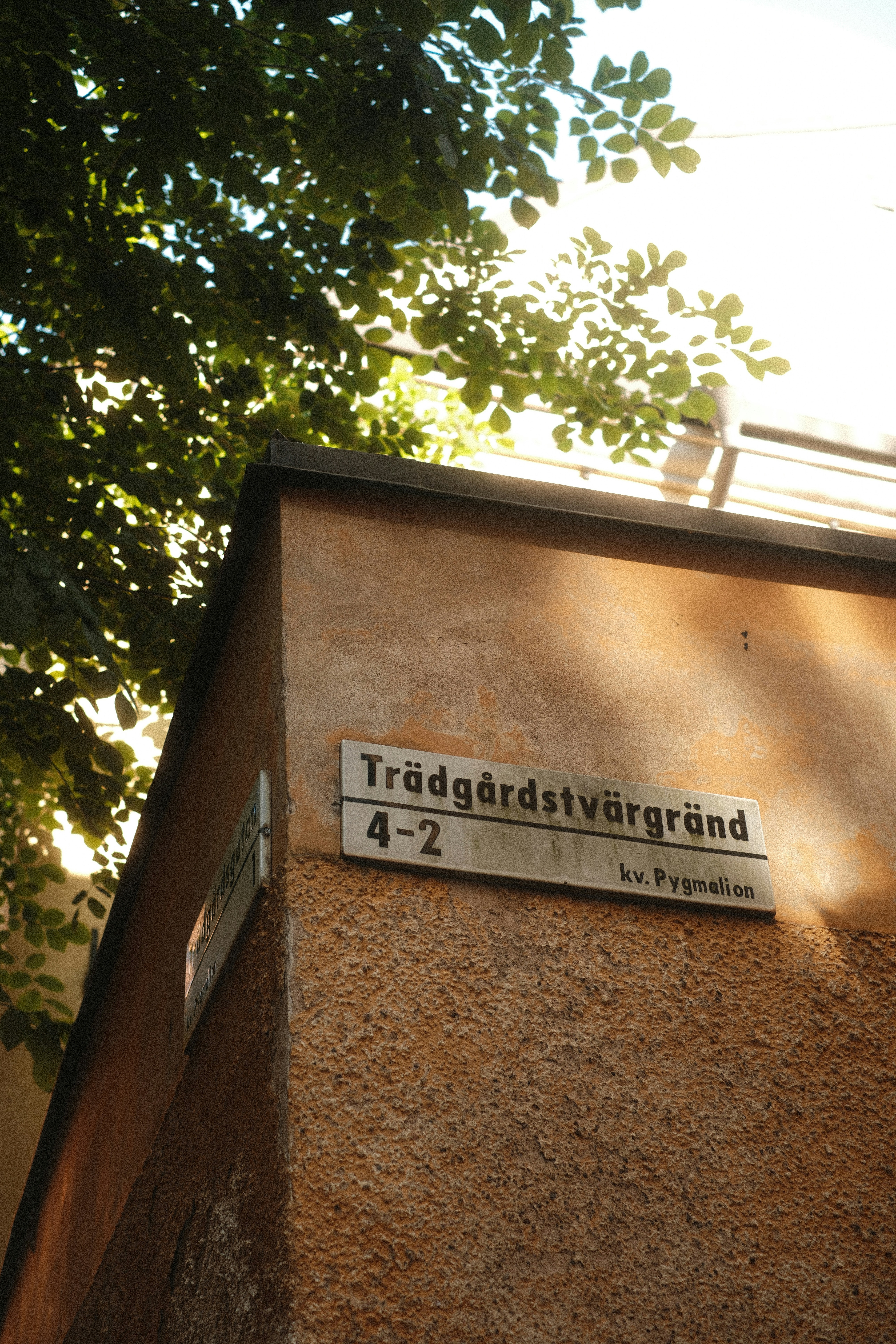 Golden Hour dappled sunlight on the old brick exterior of a building in Gamla Stan, Stockholm, Sweden