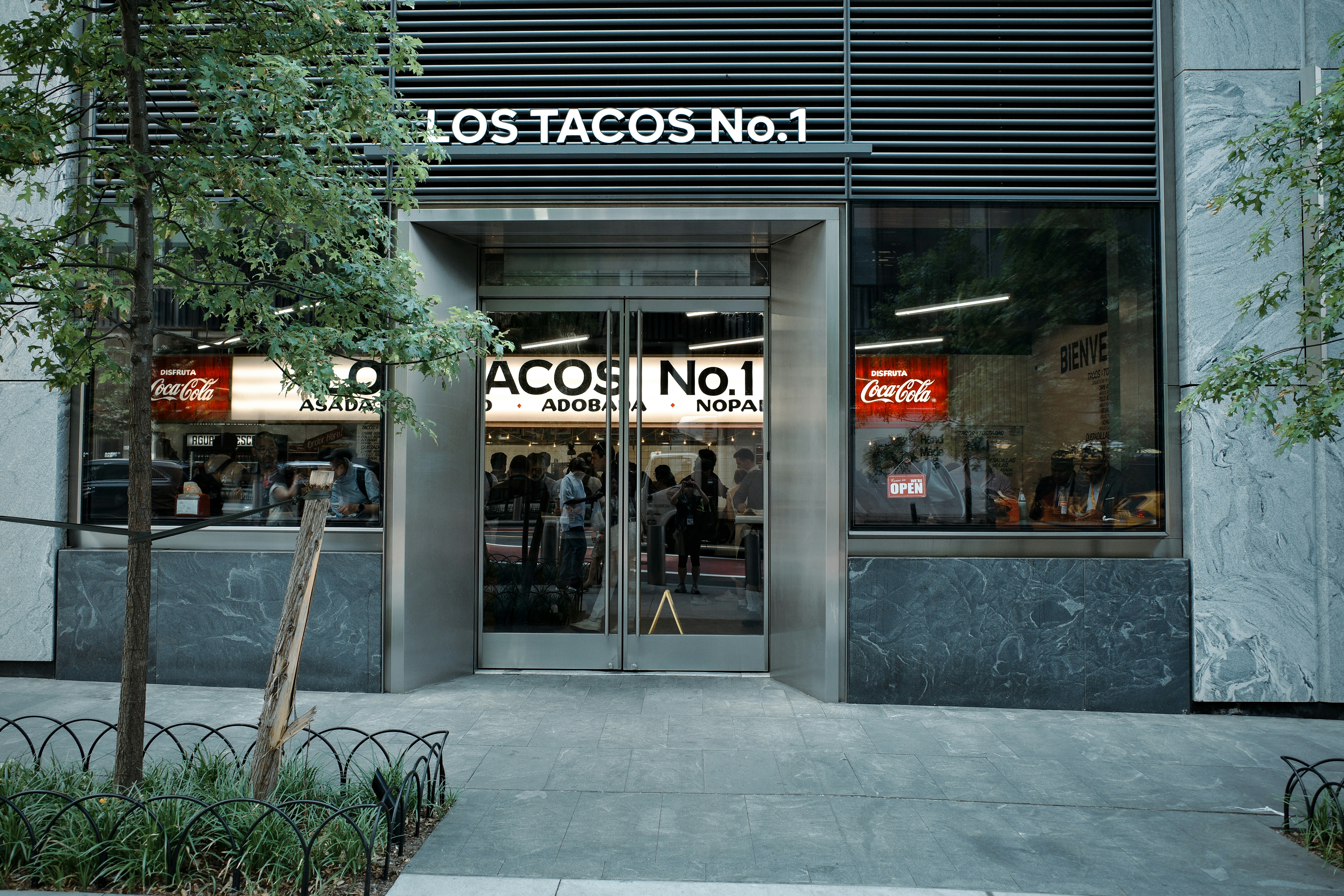 photograph of los tacos no.1 by hudson yards in new york city | Los tacos no. 1 restaurant front entrance.