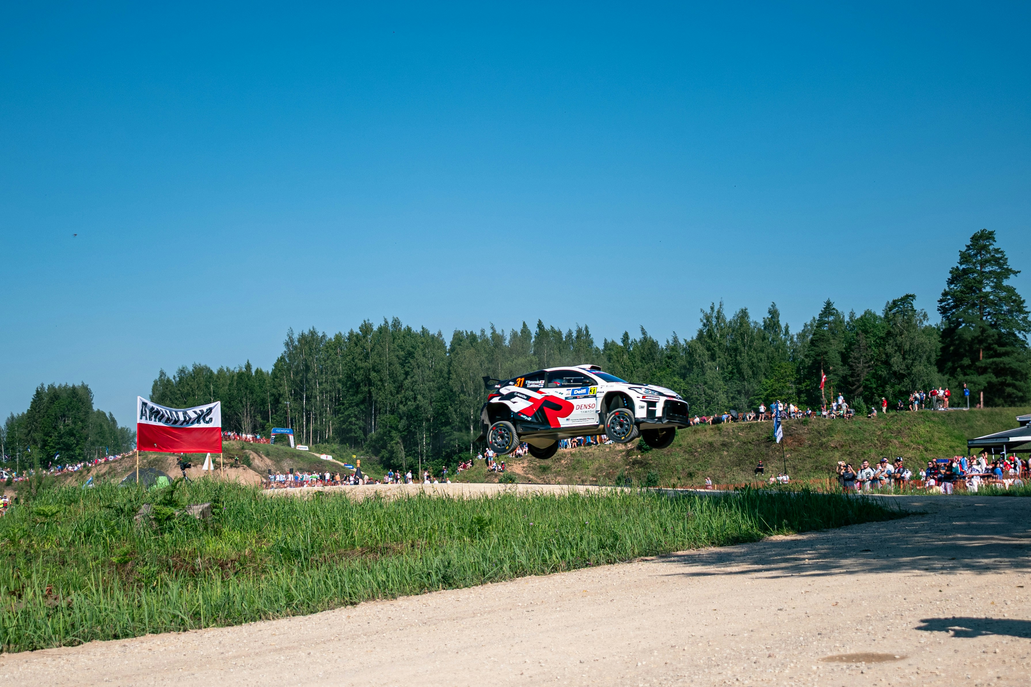 Soaring Through the Air: A Rally Car's Gravity-Defying Leap