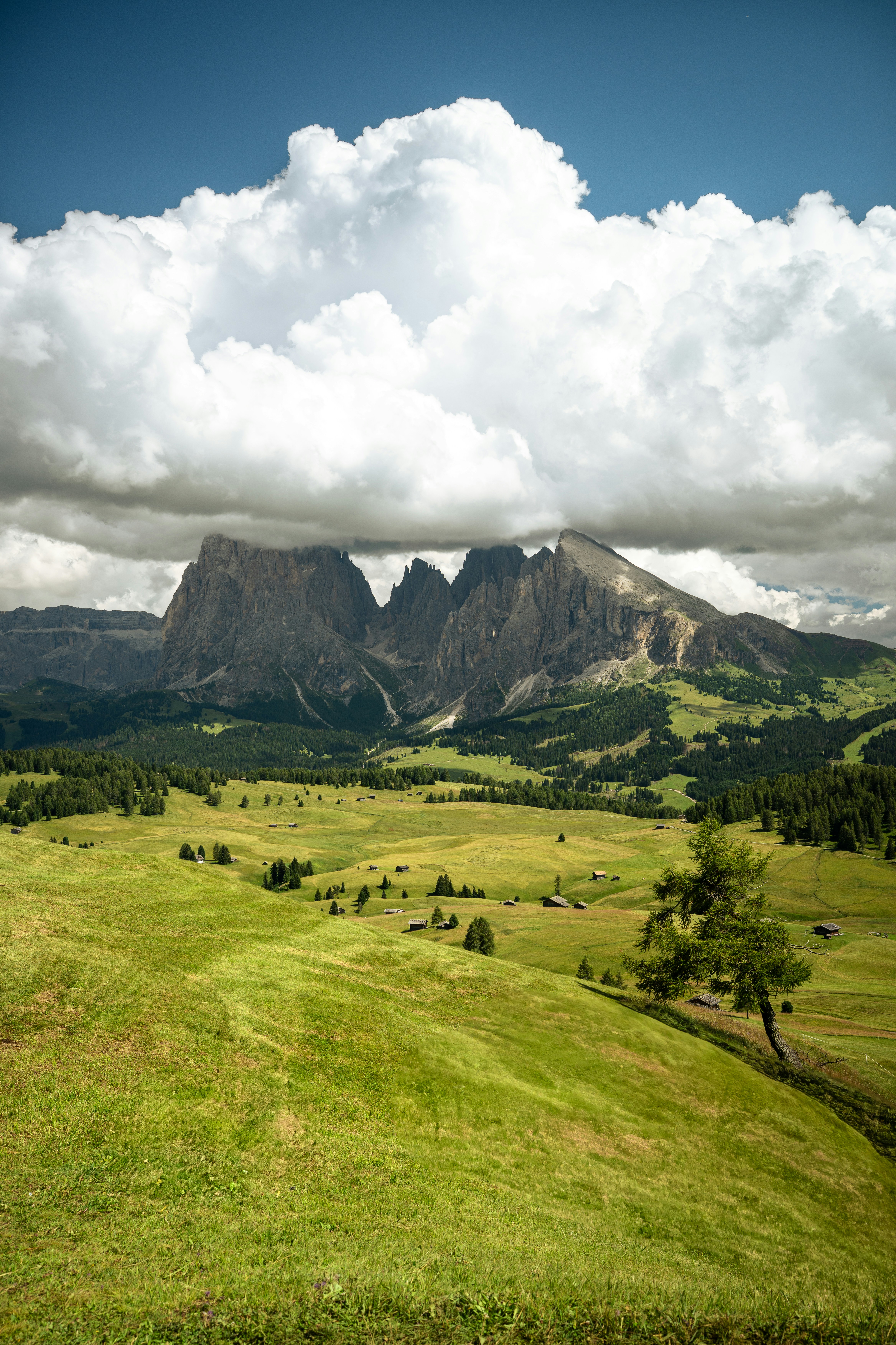 Whispers of the Dolomites: A Cloud-Cloaked Majesty