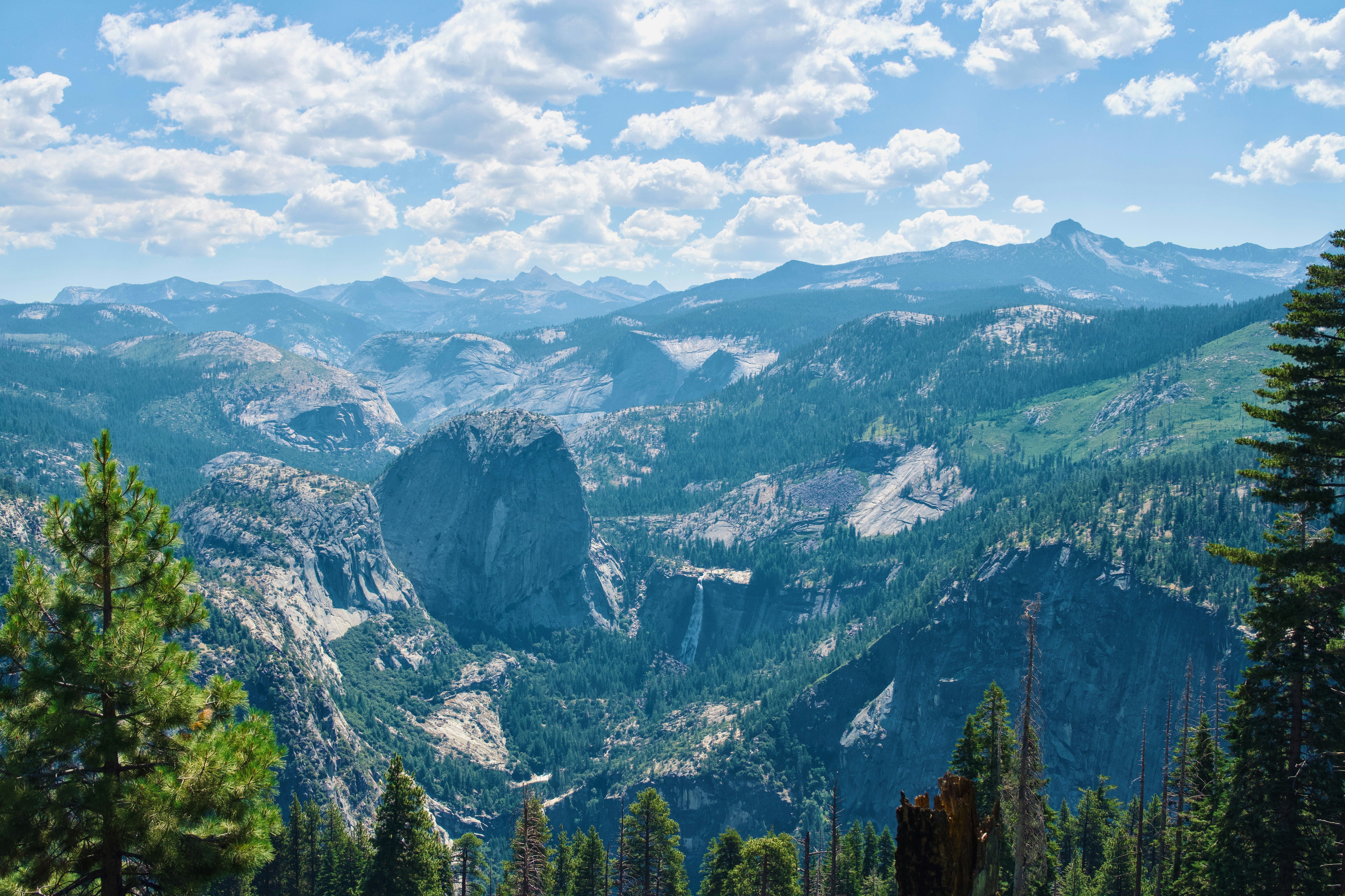 Scenic view of mountains under a bright sky.