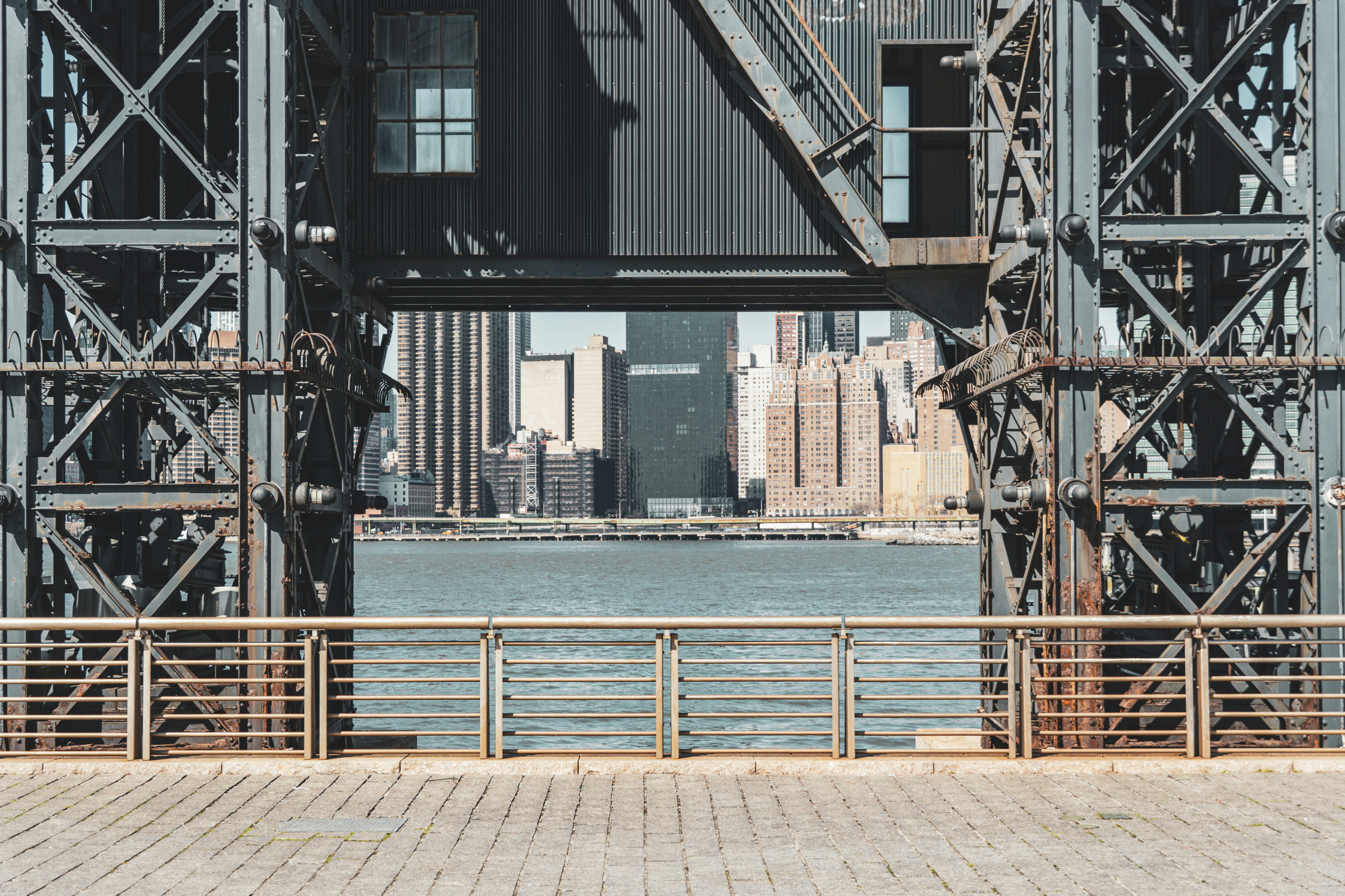 Steel structure frames the city skyline.