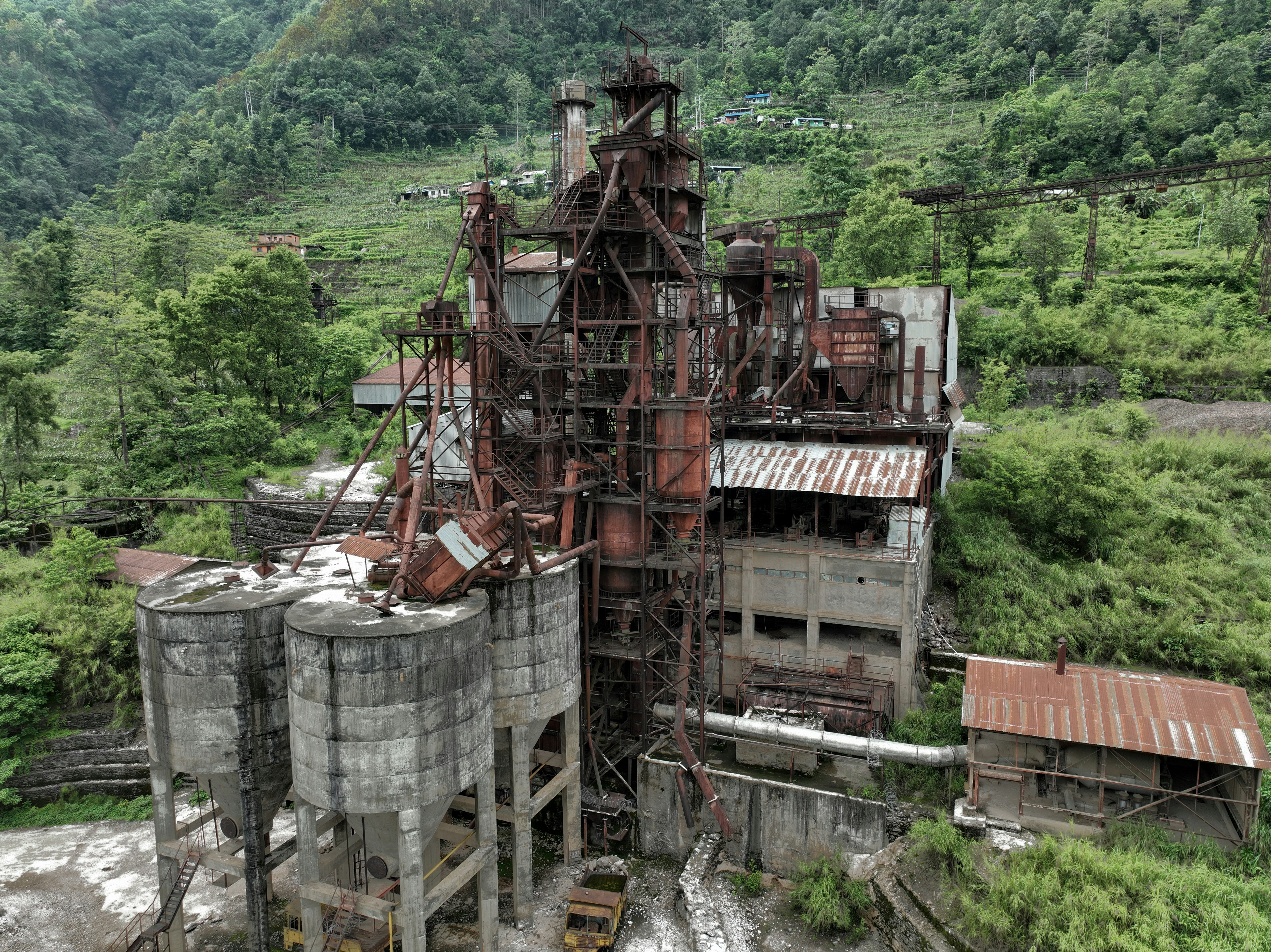 Rustbound Giants Amid a Green Valley