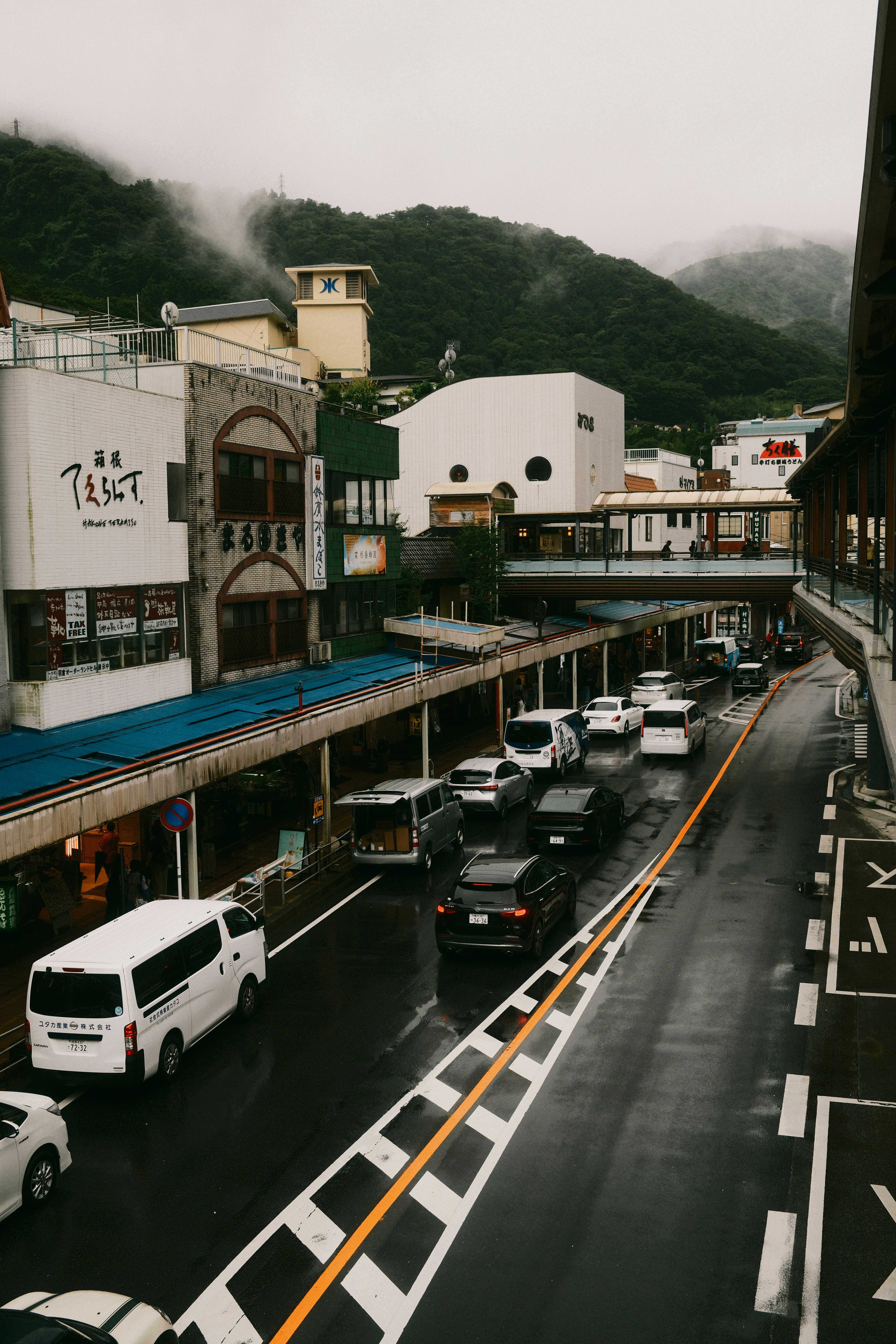 Urban Serenity Amidst Misty Mountains
