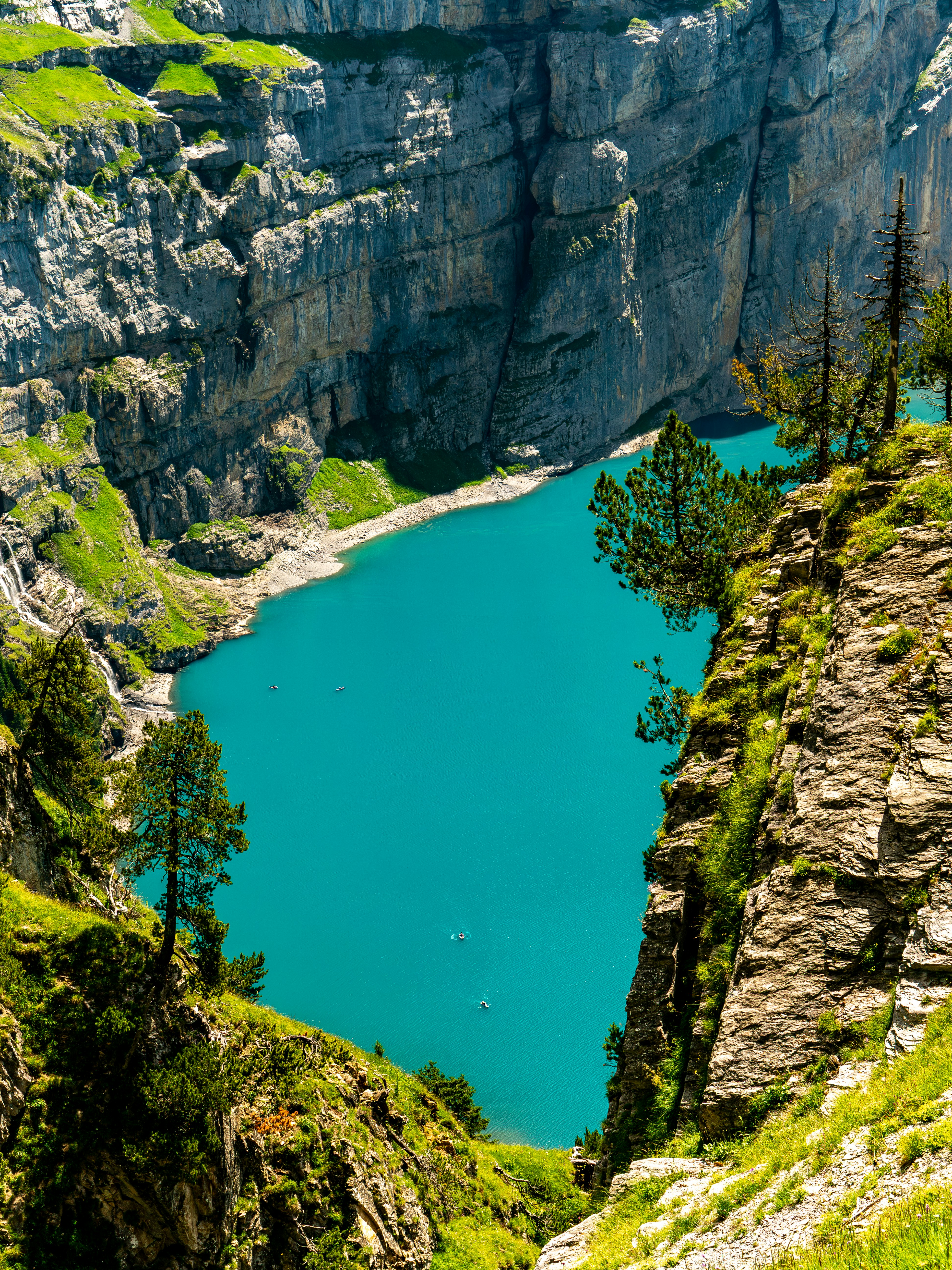 Emerald Waters Embraced by Majestic Cliffs