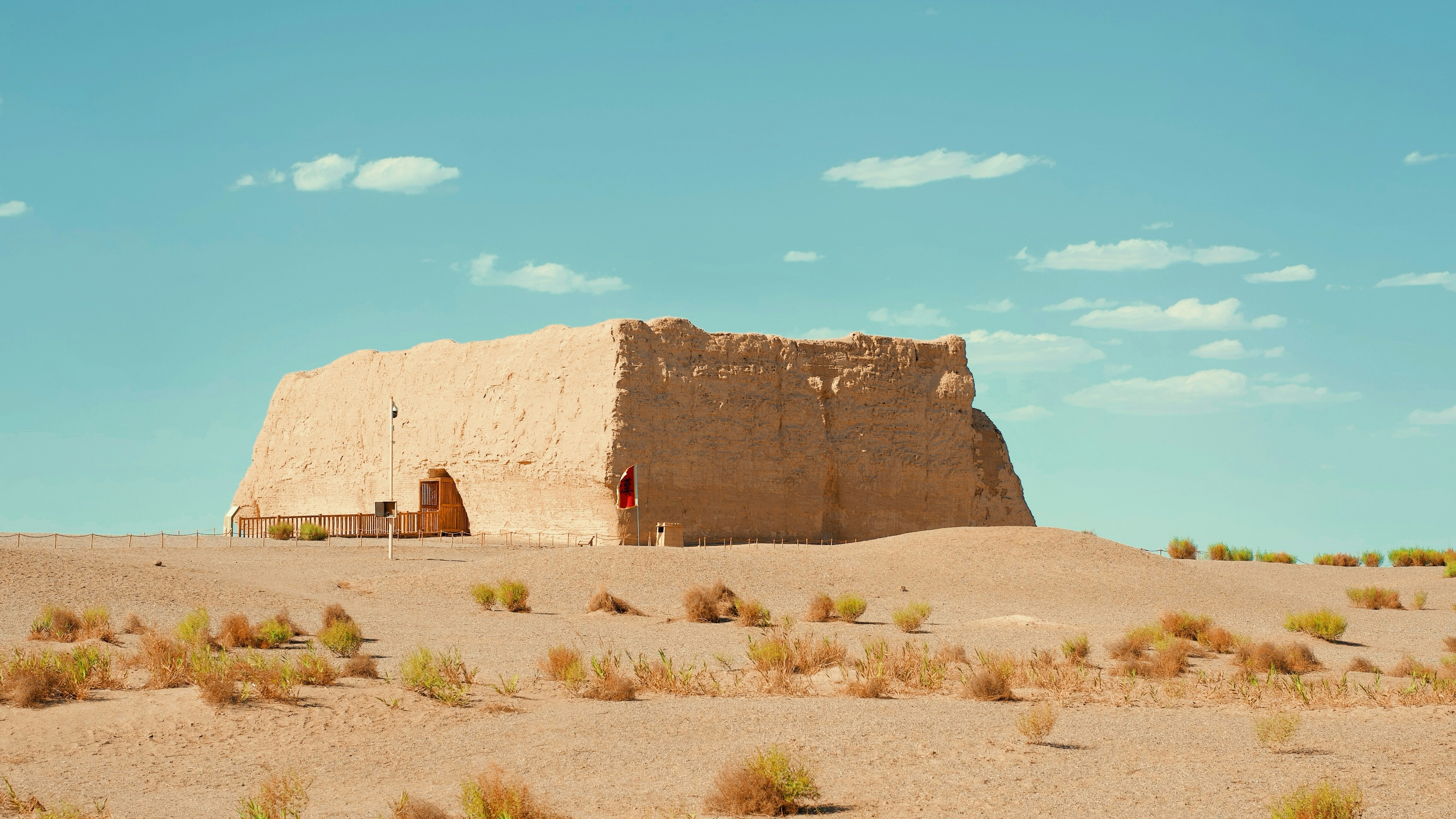 dunhuang | An ancient structure stands in the desert.