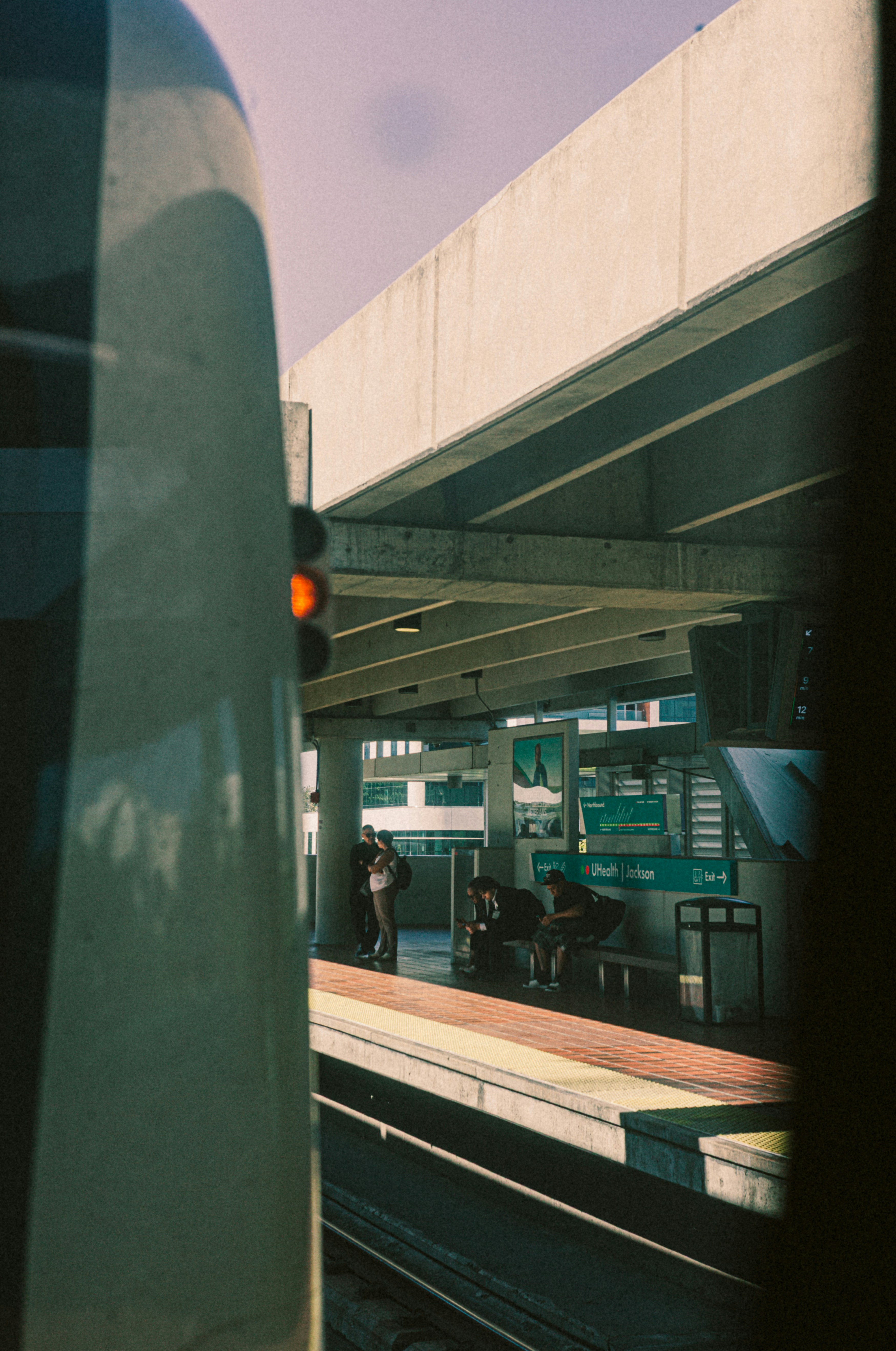 A train waits at the station platform.