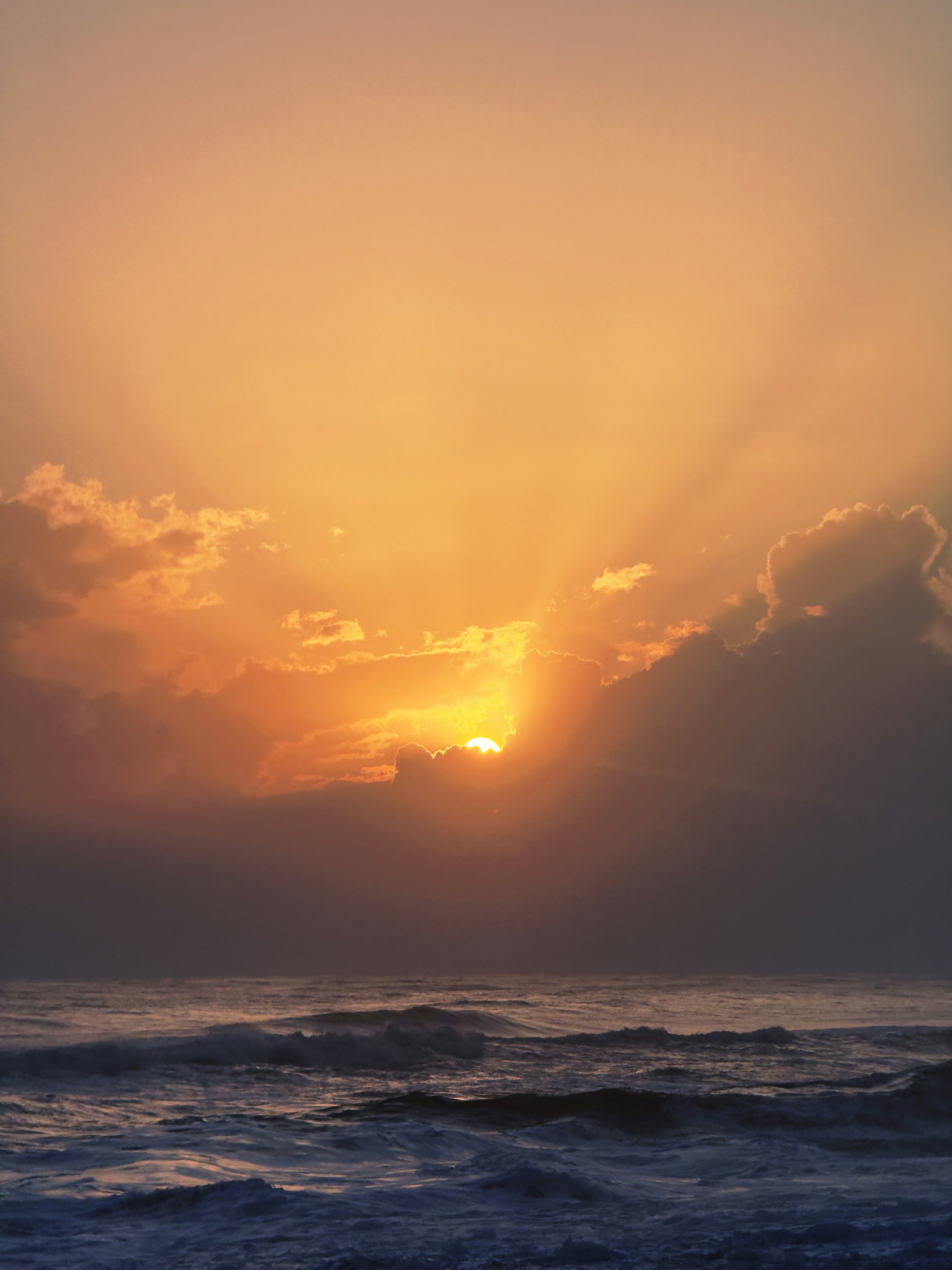Dawn's Embrace: A Symphony of Light and Sea
