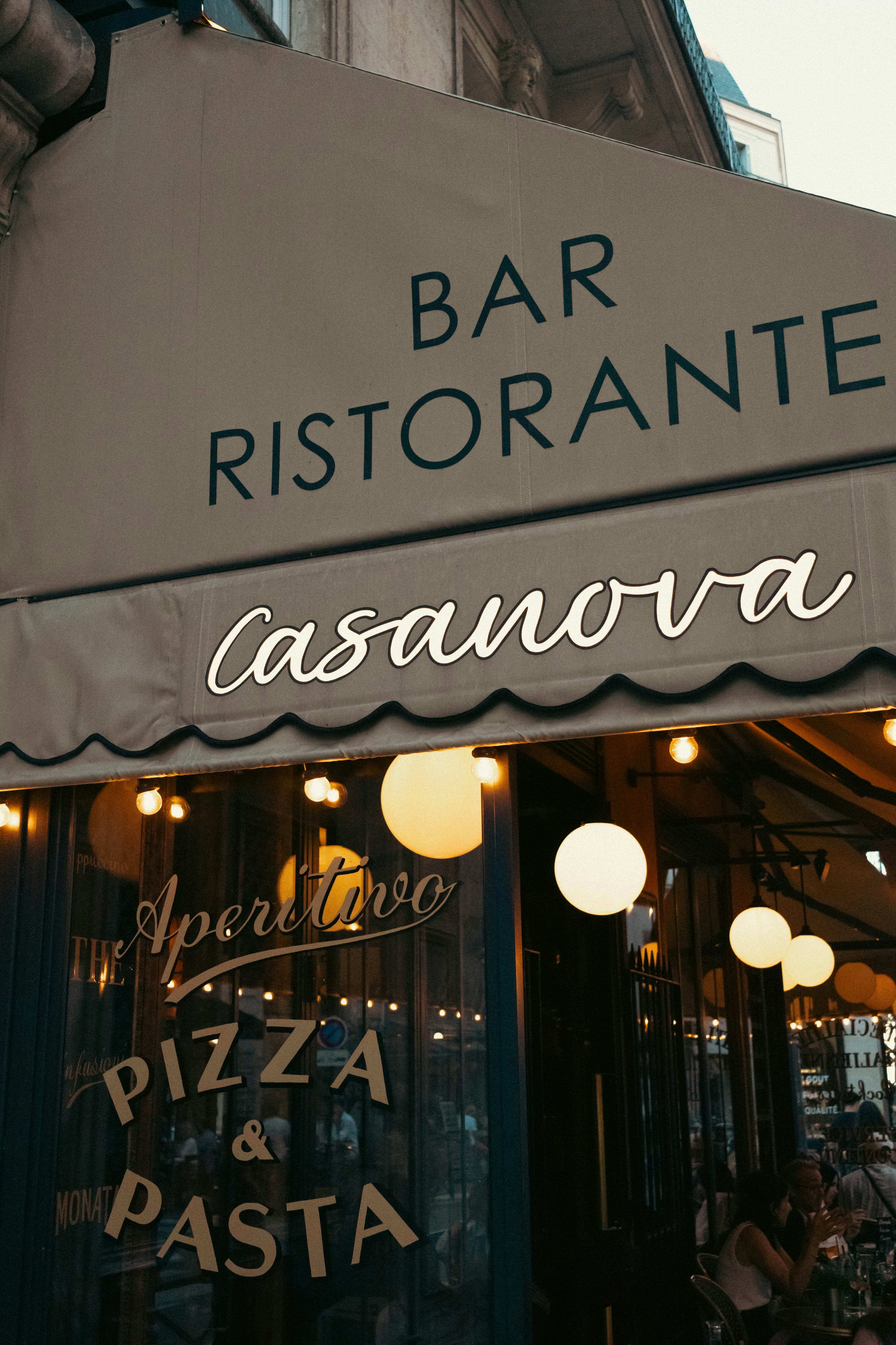 A restaurant named casanova with outdoor seating.