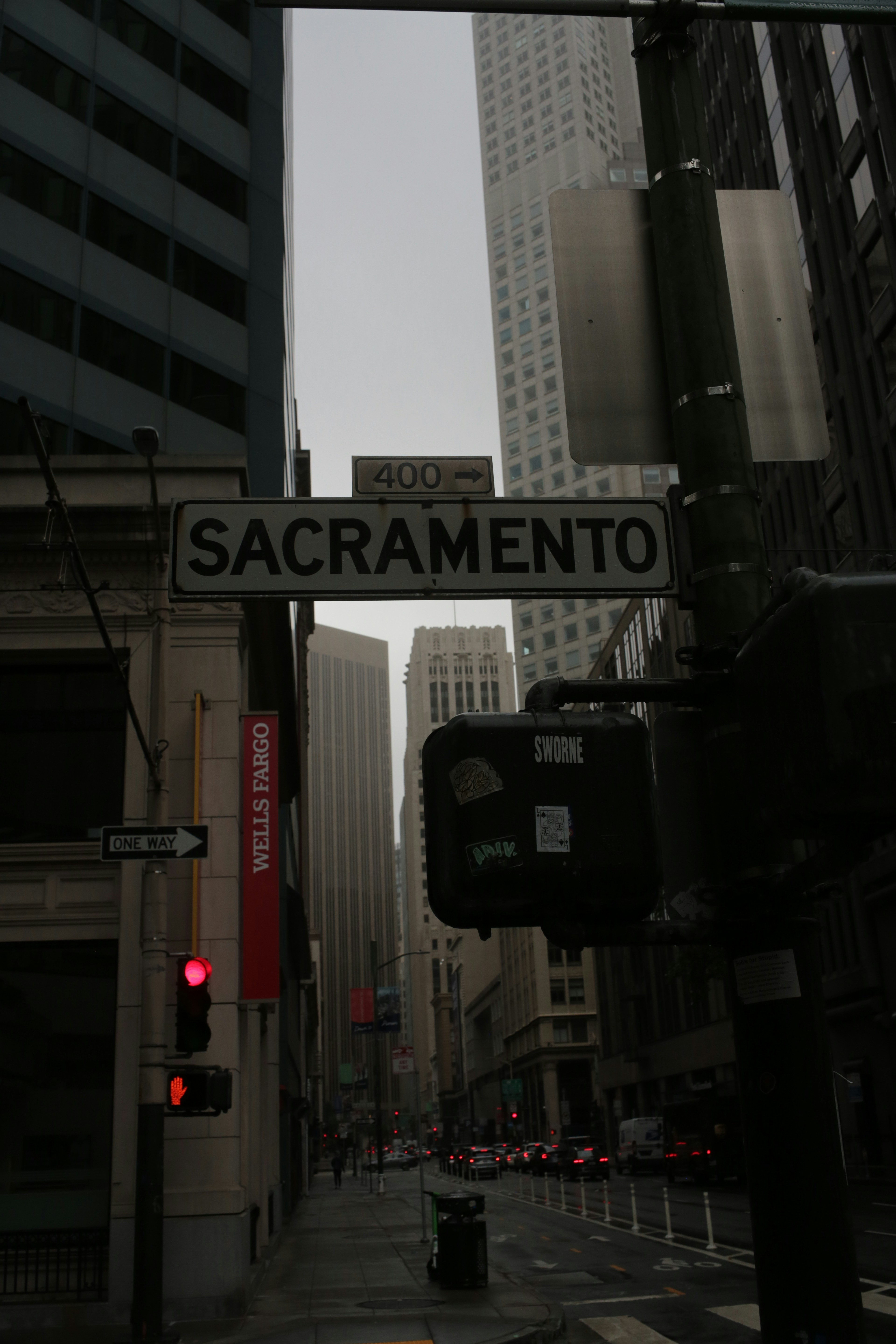 Sacramento street sign in a bustling urban city.
