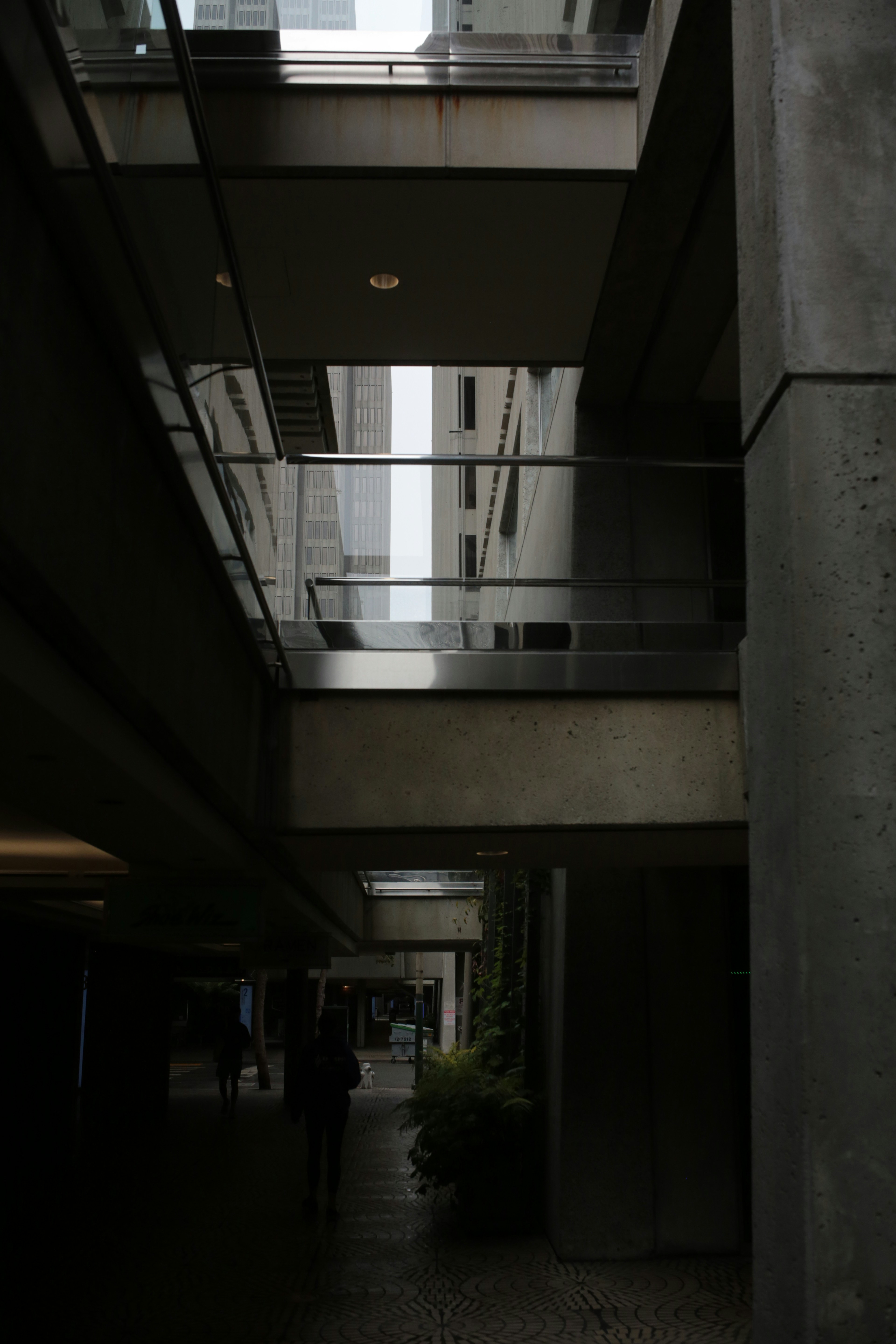 Concrete structures with a glimpse of the sky.