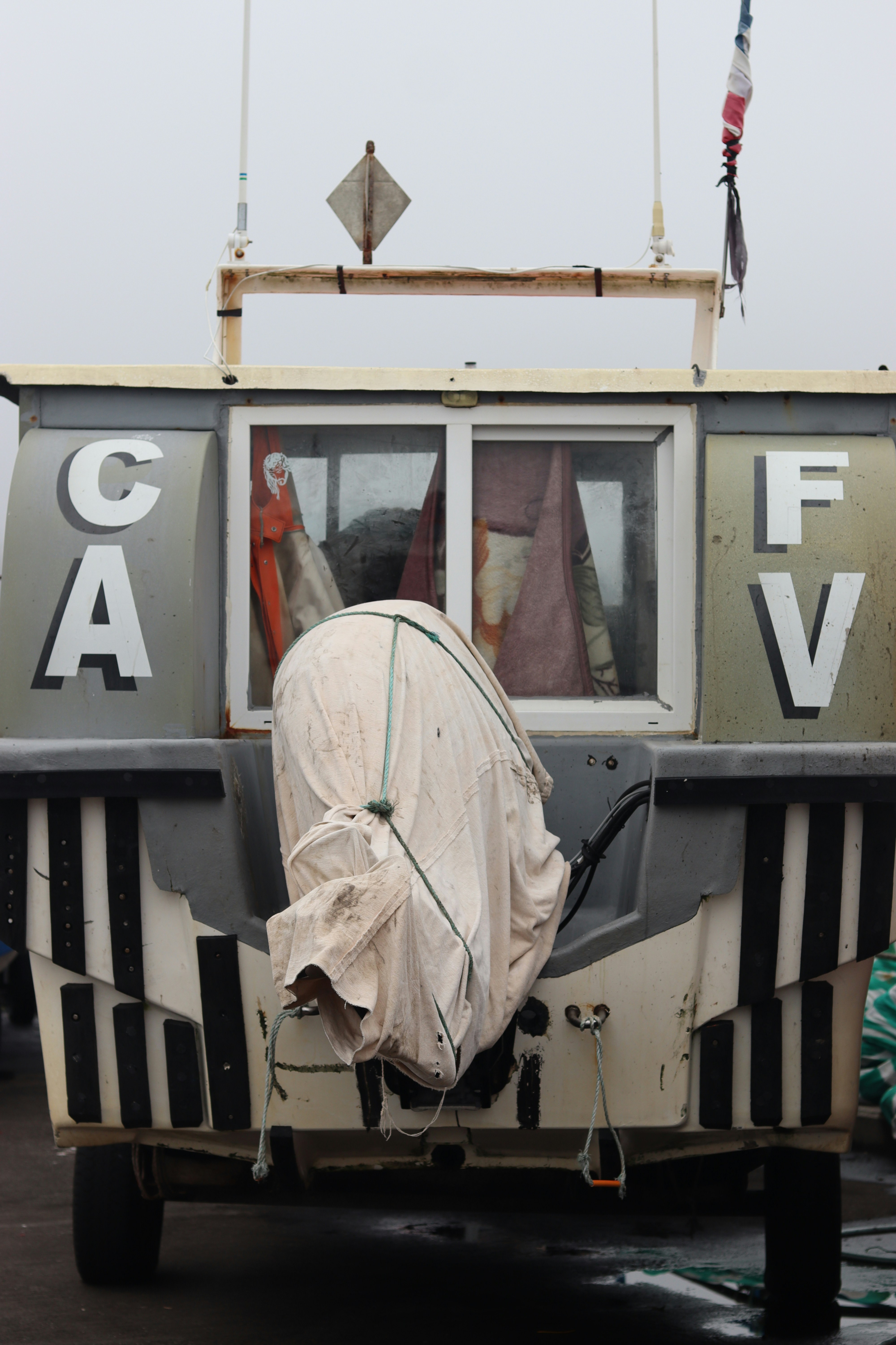 The back of a boat is visible.