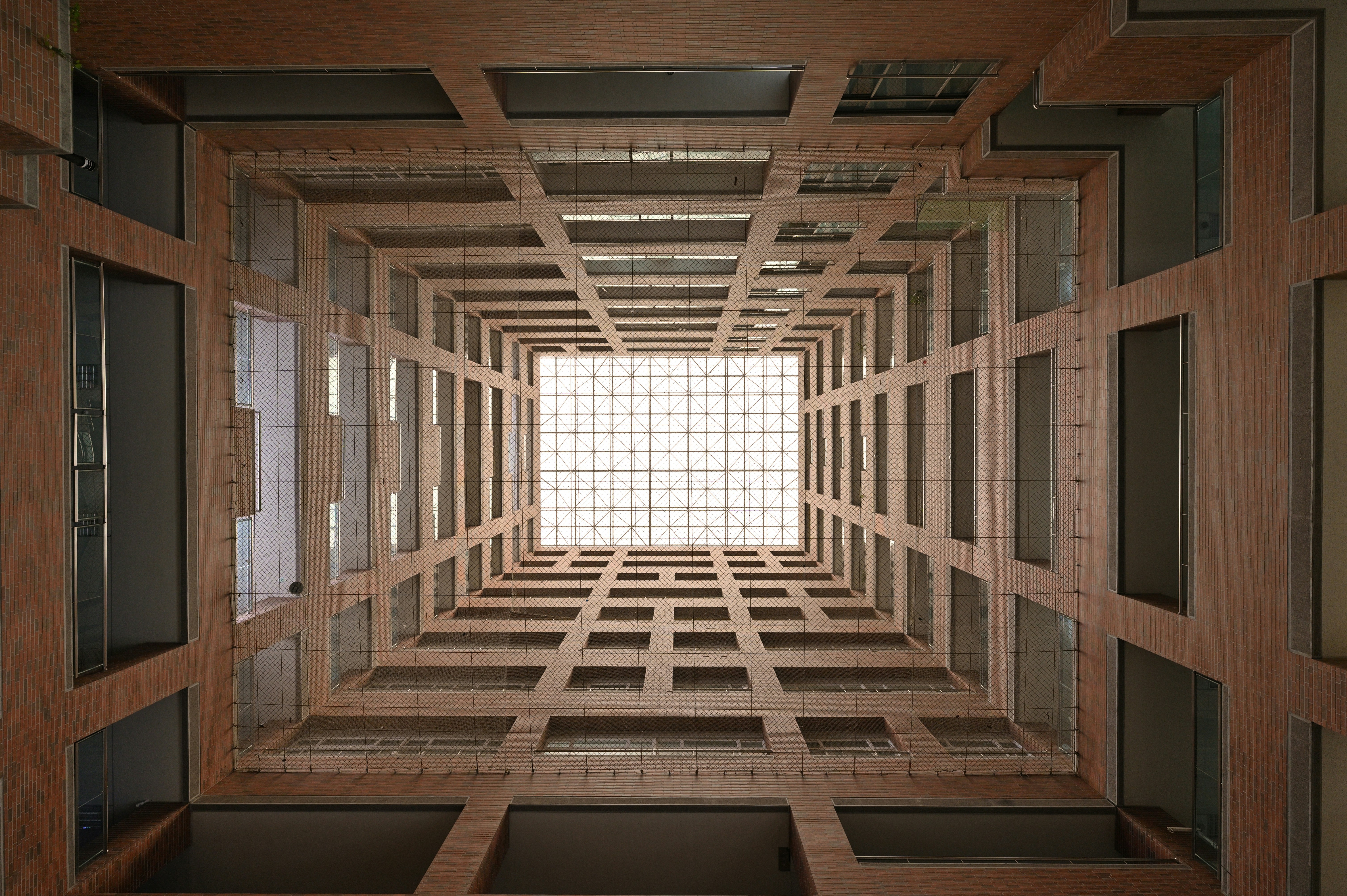 Looking up through a building's open center.