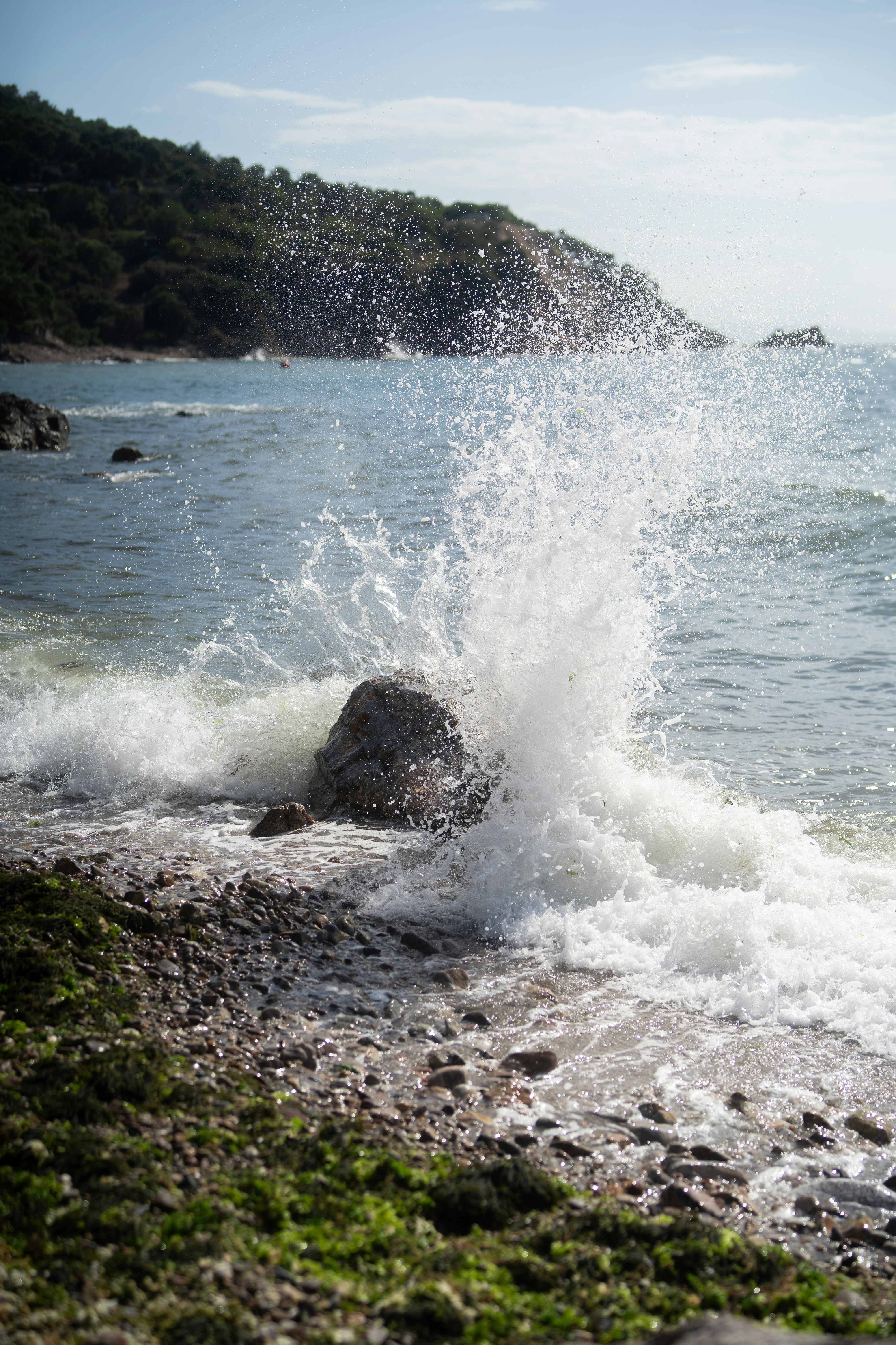 Ocean Spray Collision at the Pebble Shore