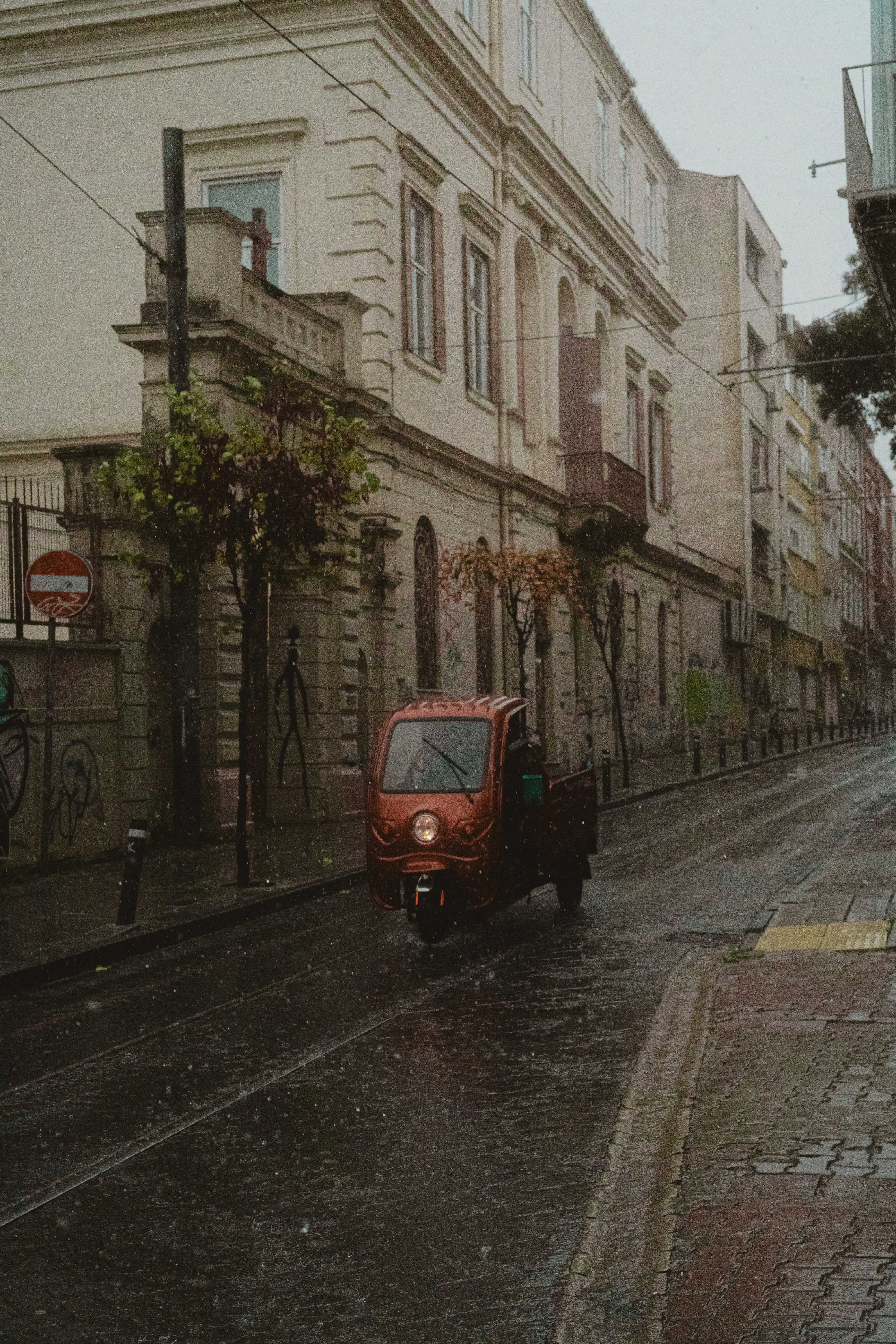 Urban Journey Through a Rainy Street
