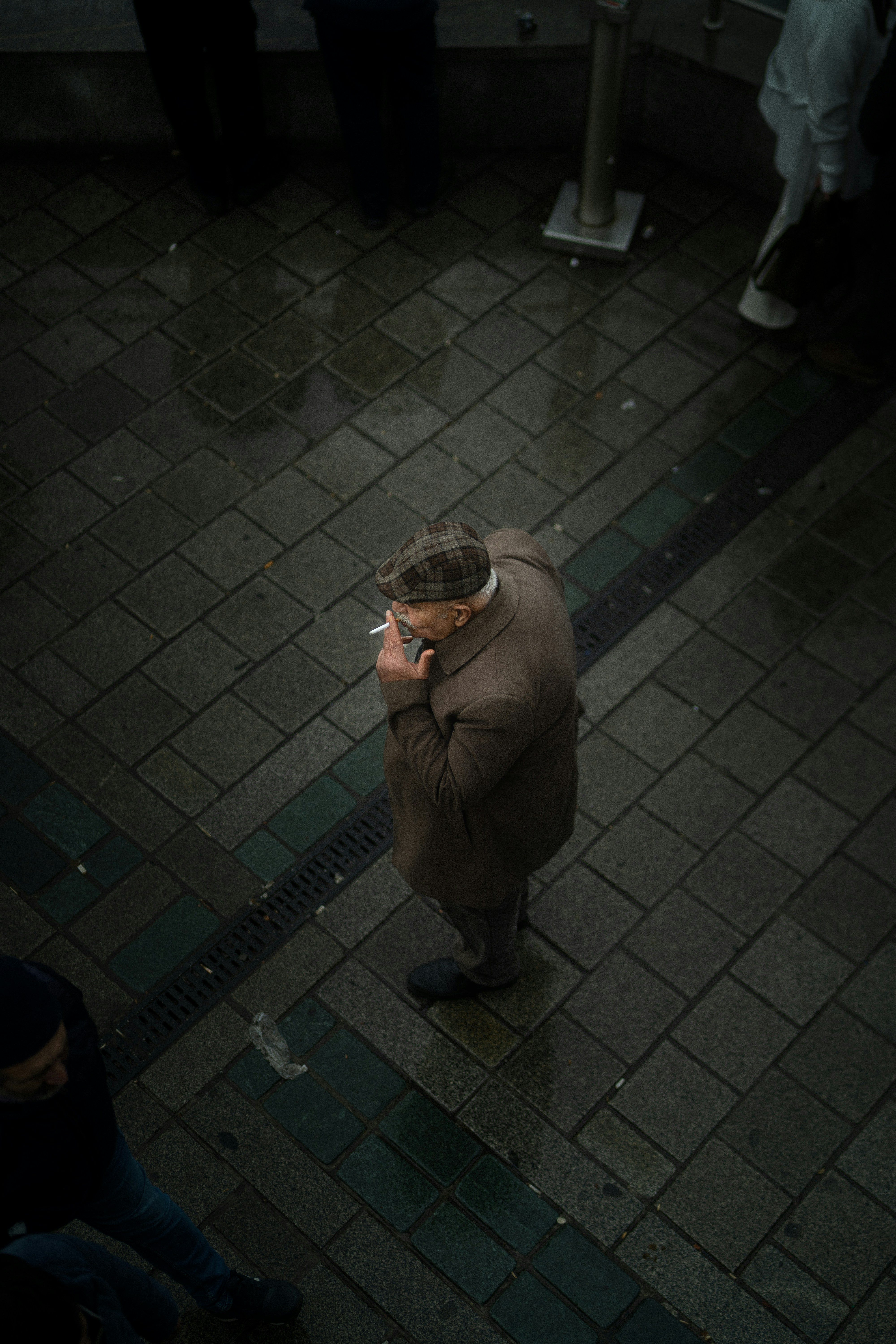 A Moment of Reflection Amidst the Crowd