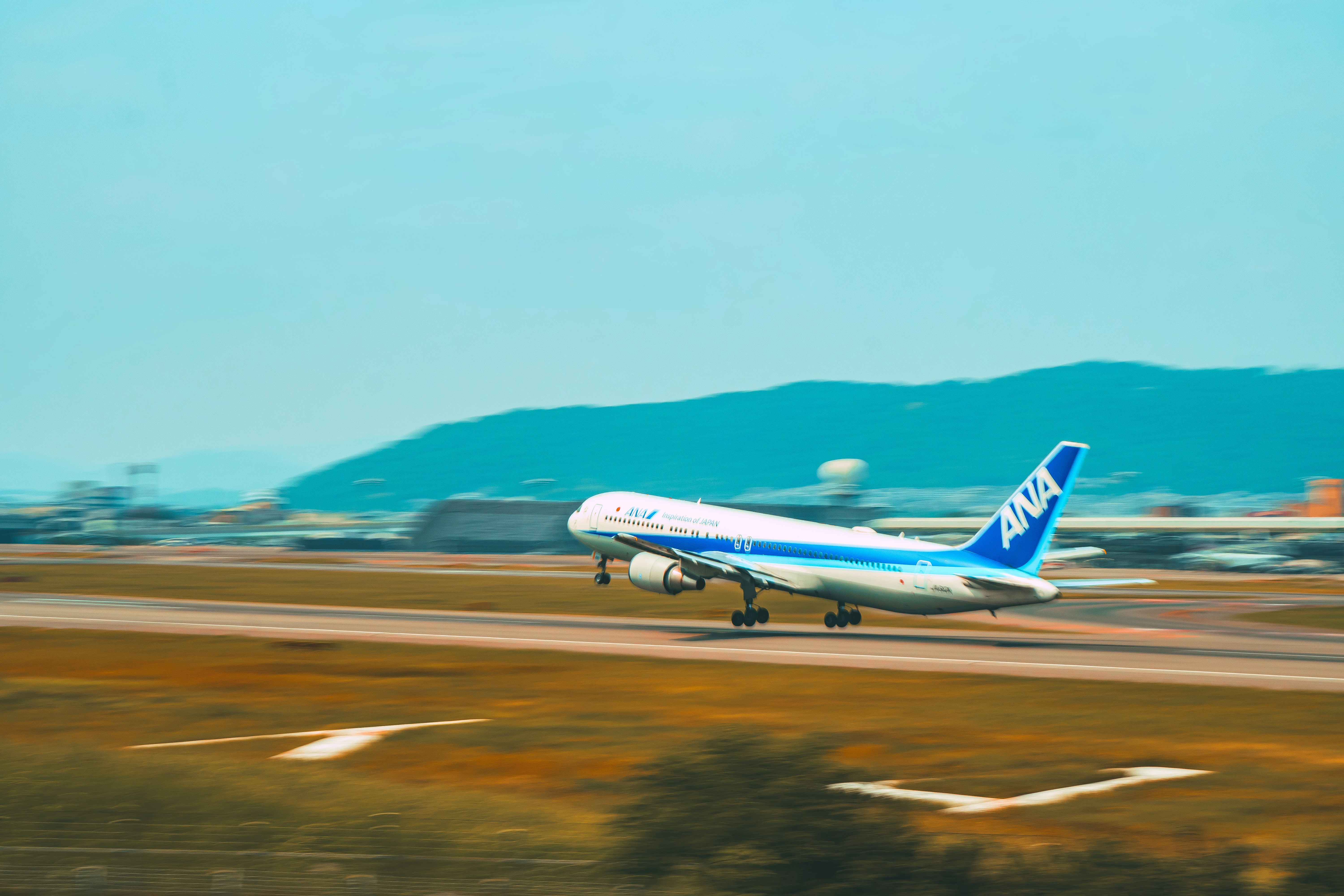 An airplane takes off from the runway.
