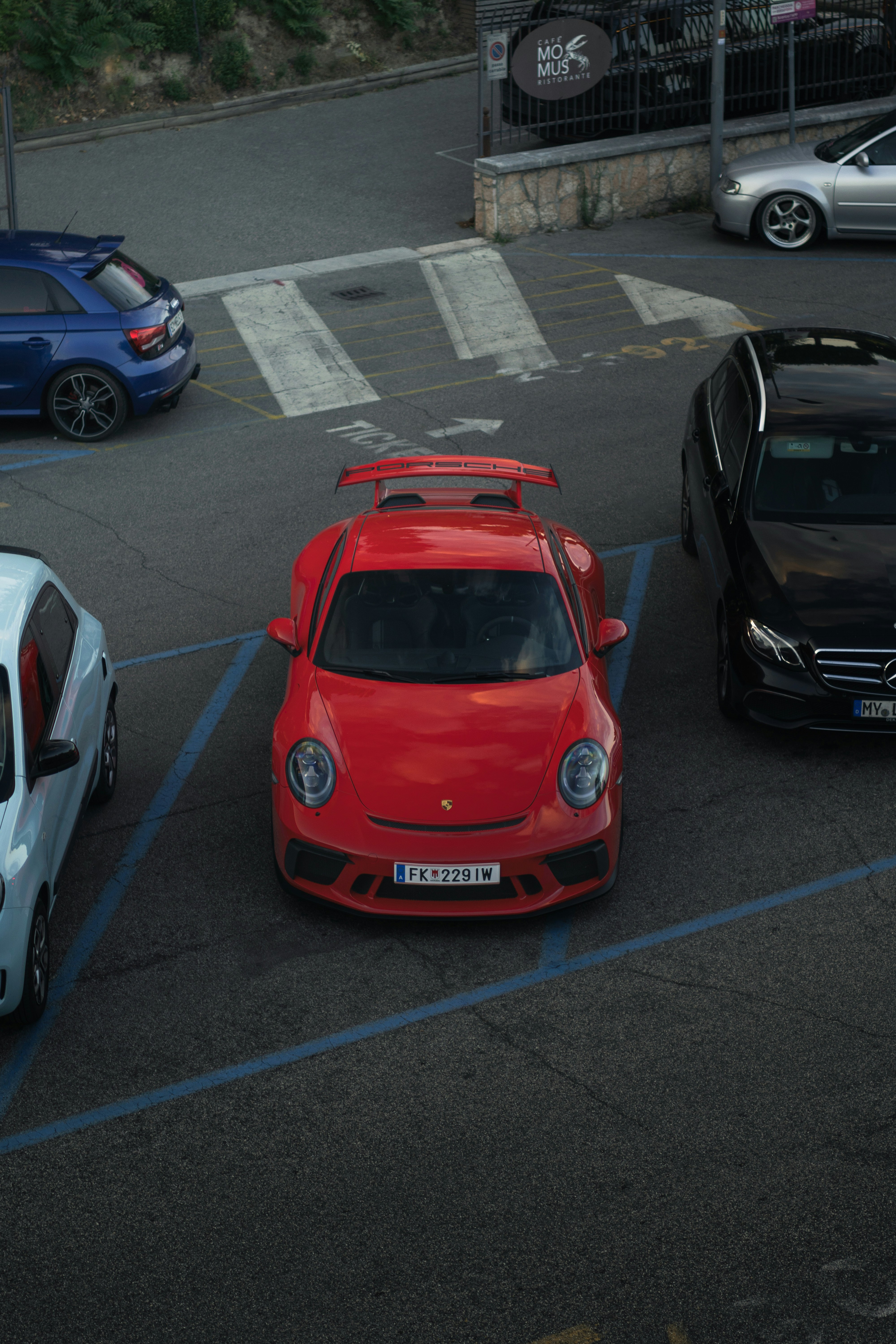 Red Racer in a Sea of Steel