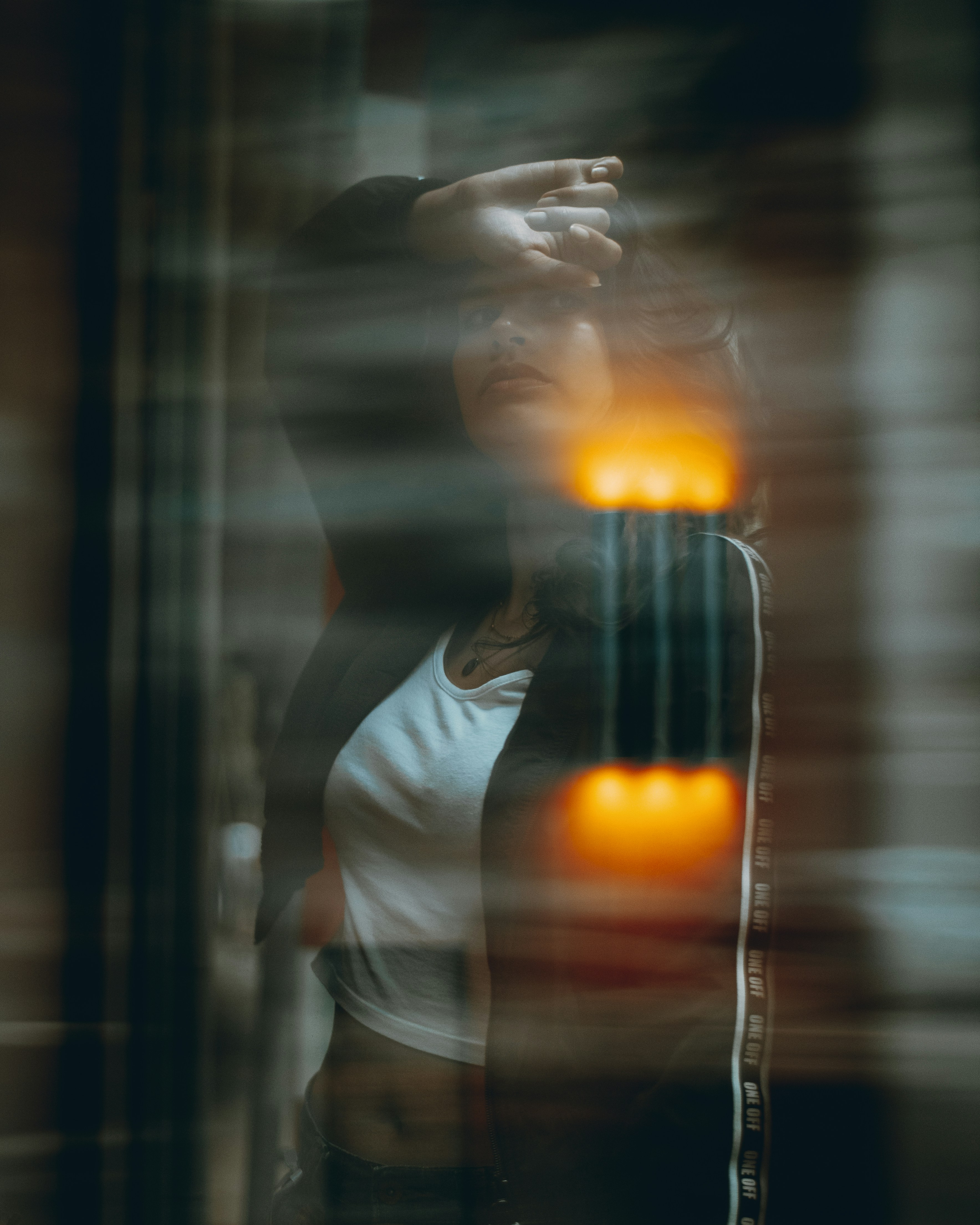 Woman is seen through a blurred, creative filter.