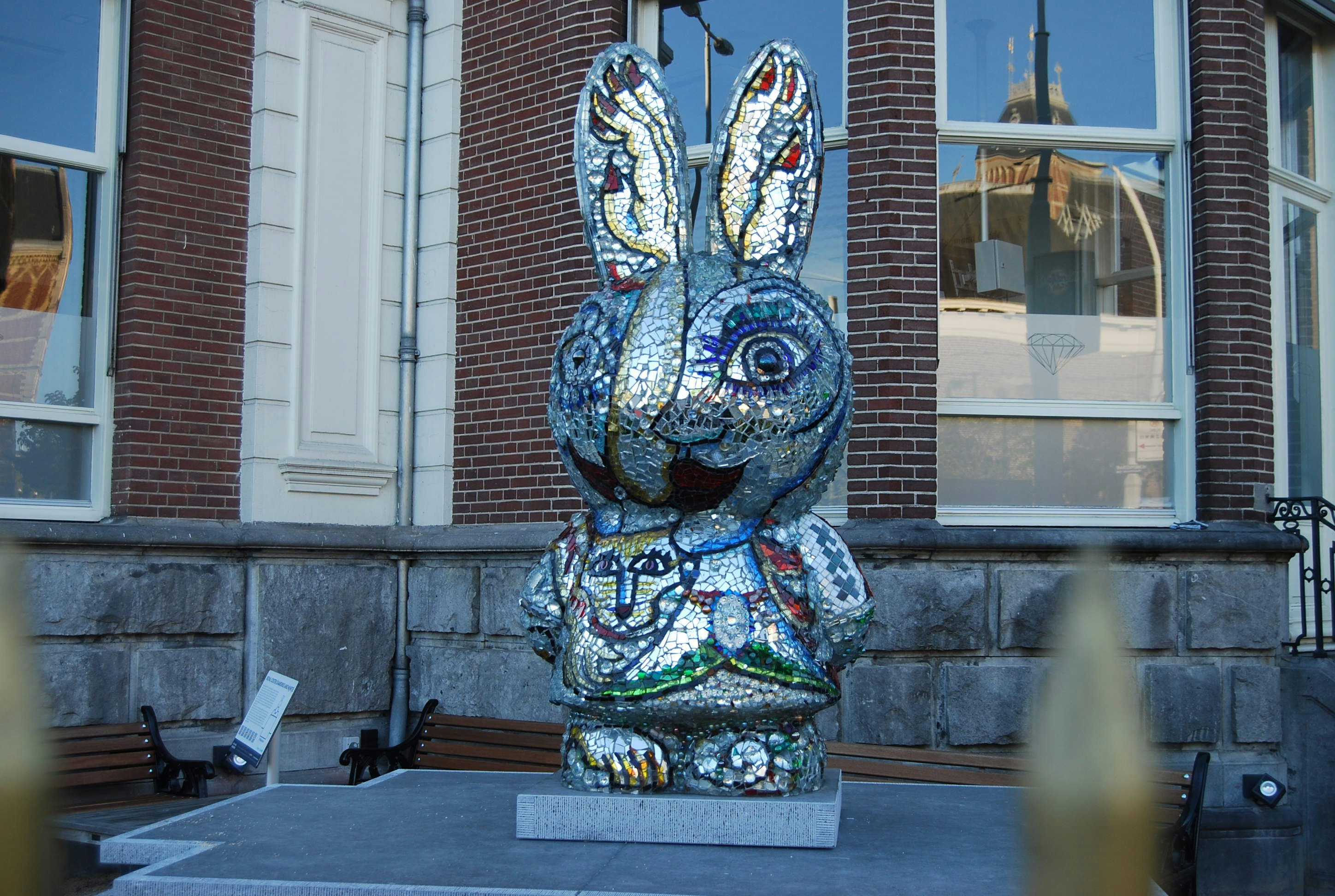 Whimsical Mosaic Bunny: A Playful Urban Sculpture