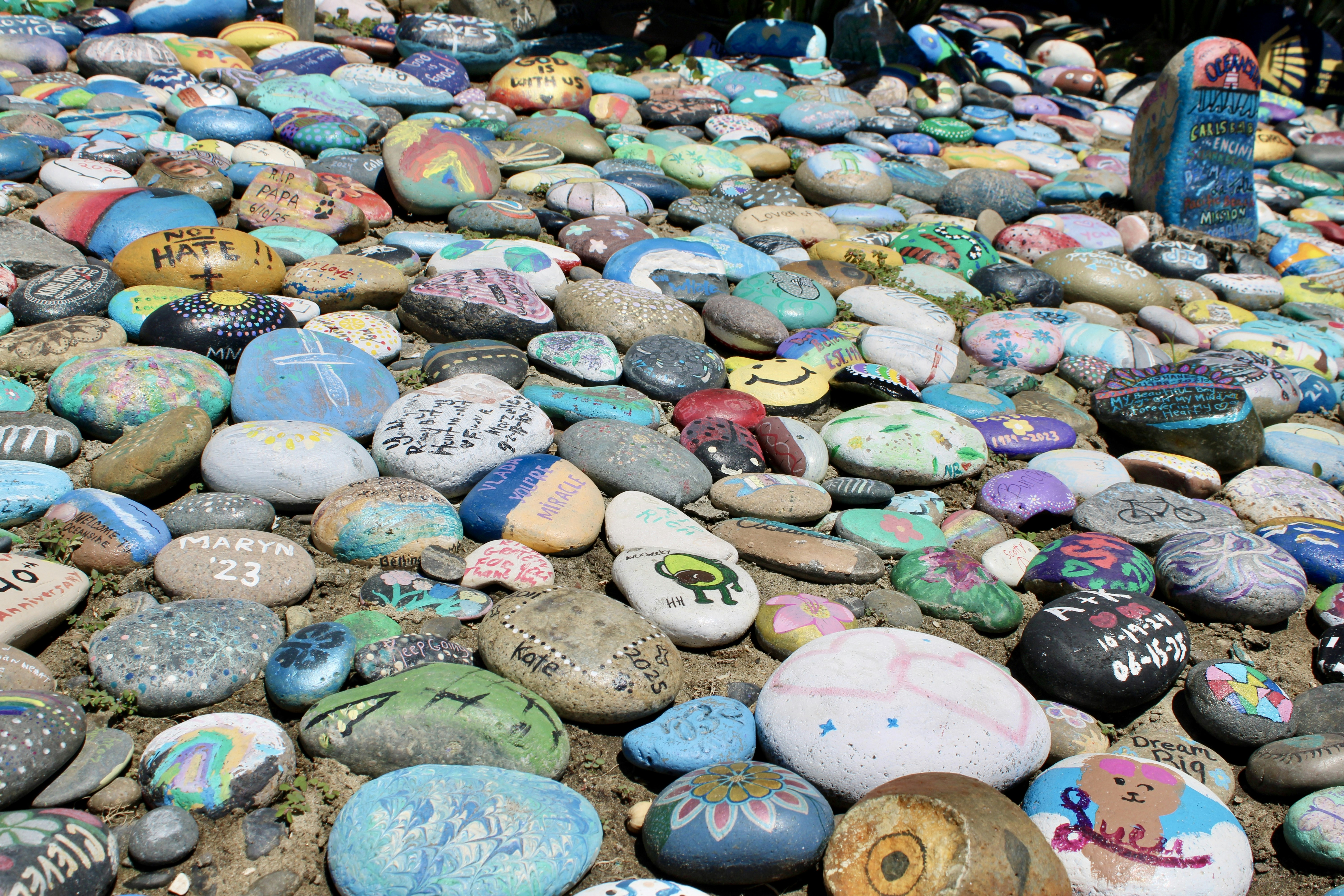 Colorful Messages on a Pebble Canvas