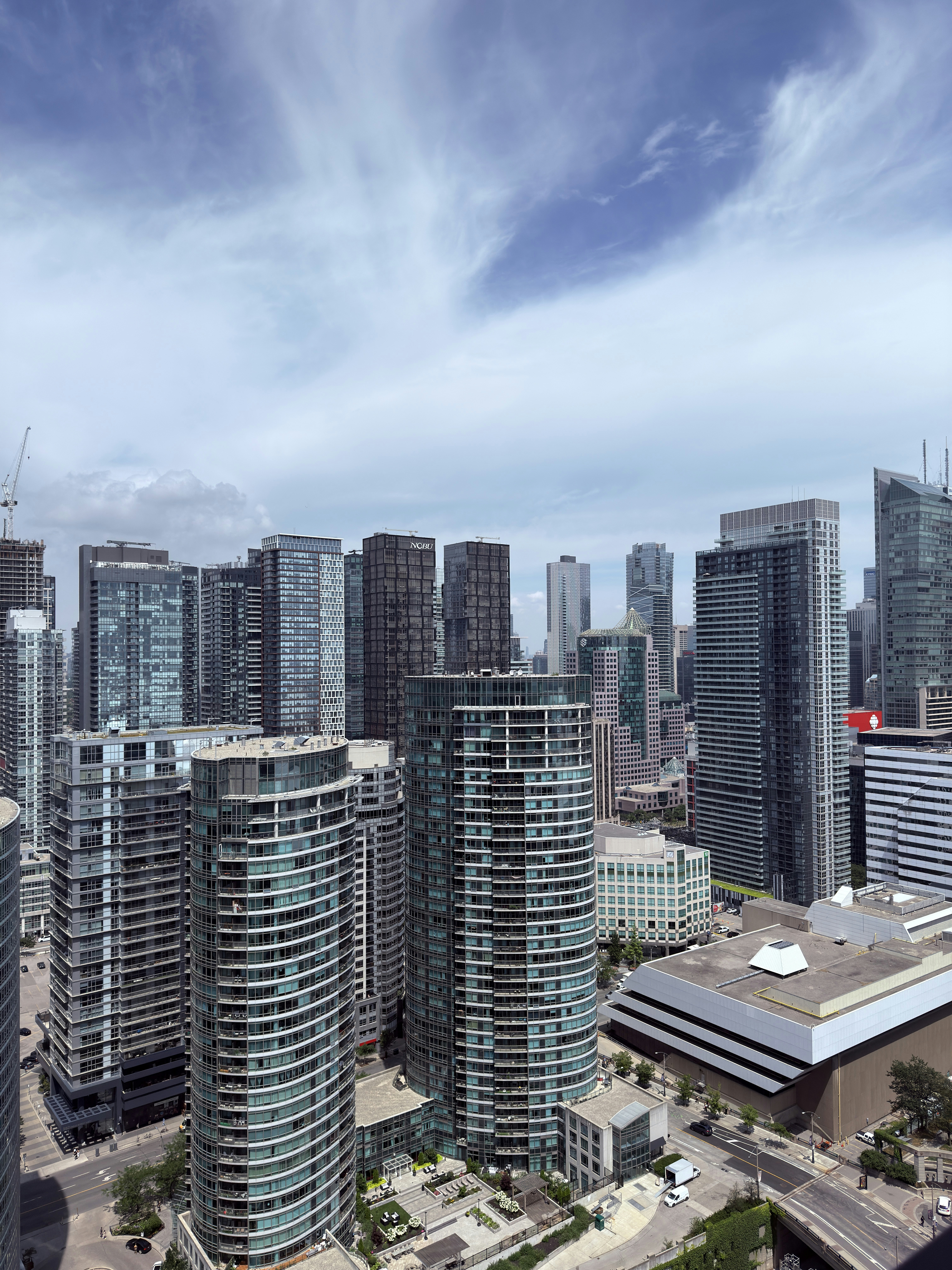 Urban Symphony: A Dance of Glass and Steel