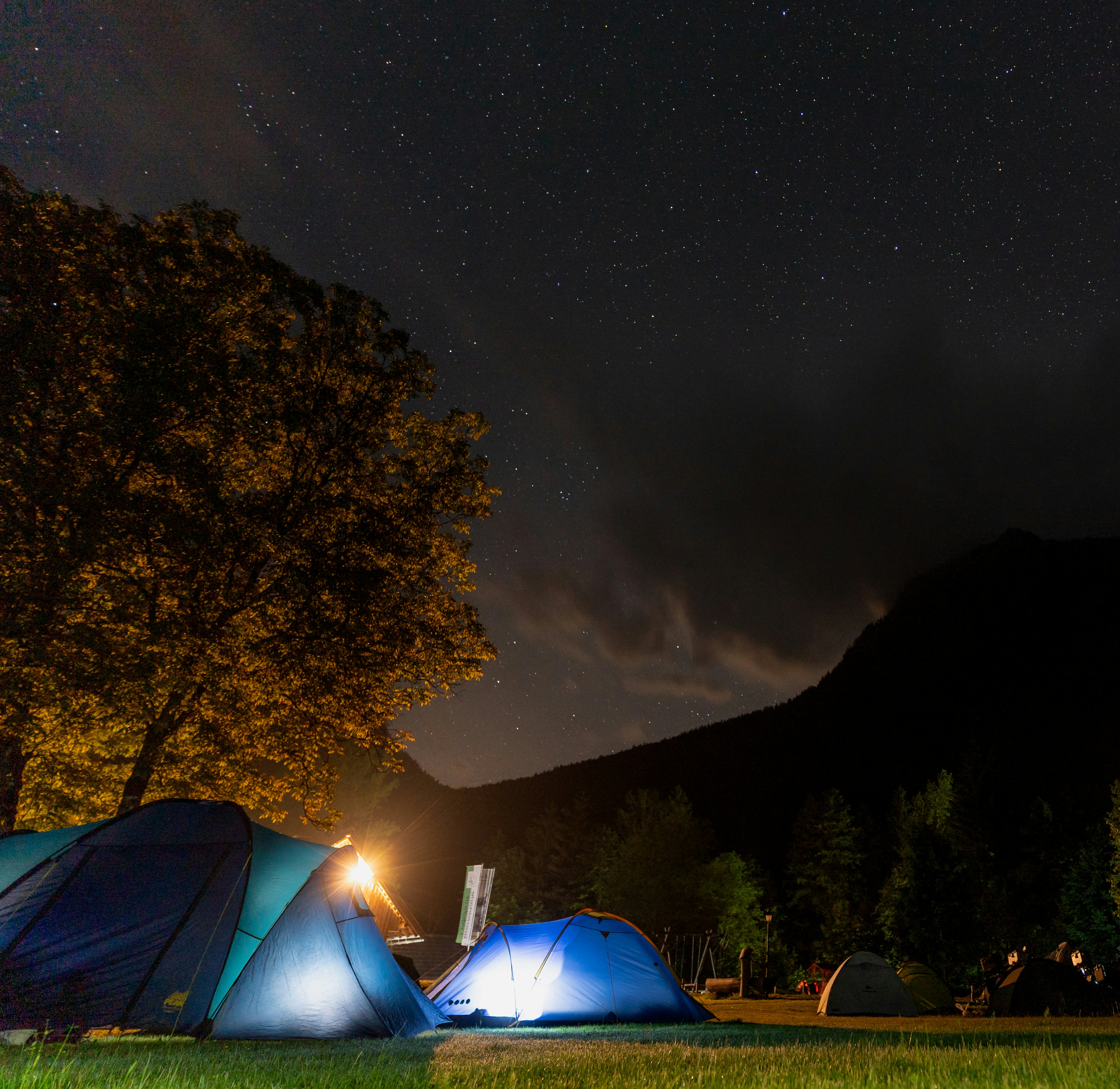 Camping under a starry night sky.