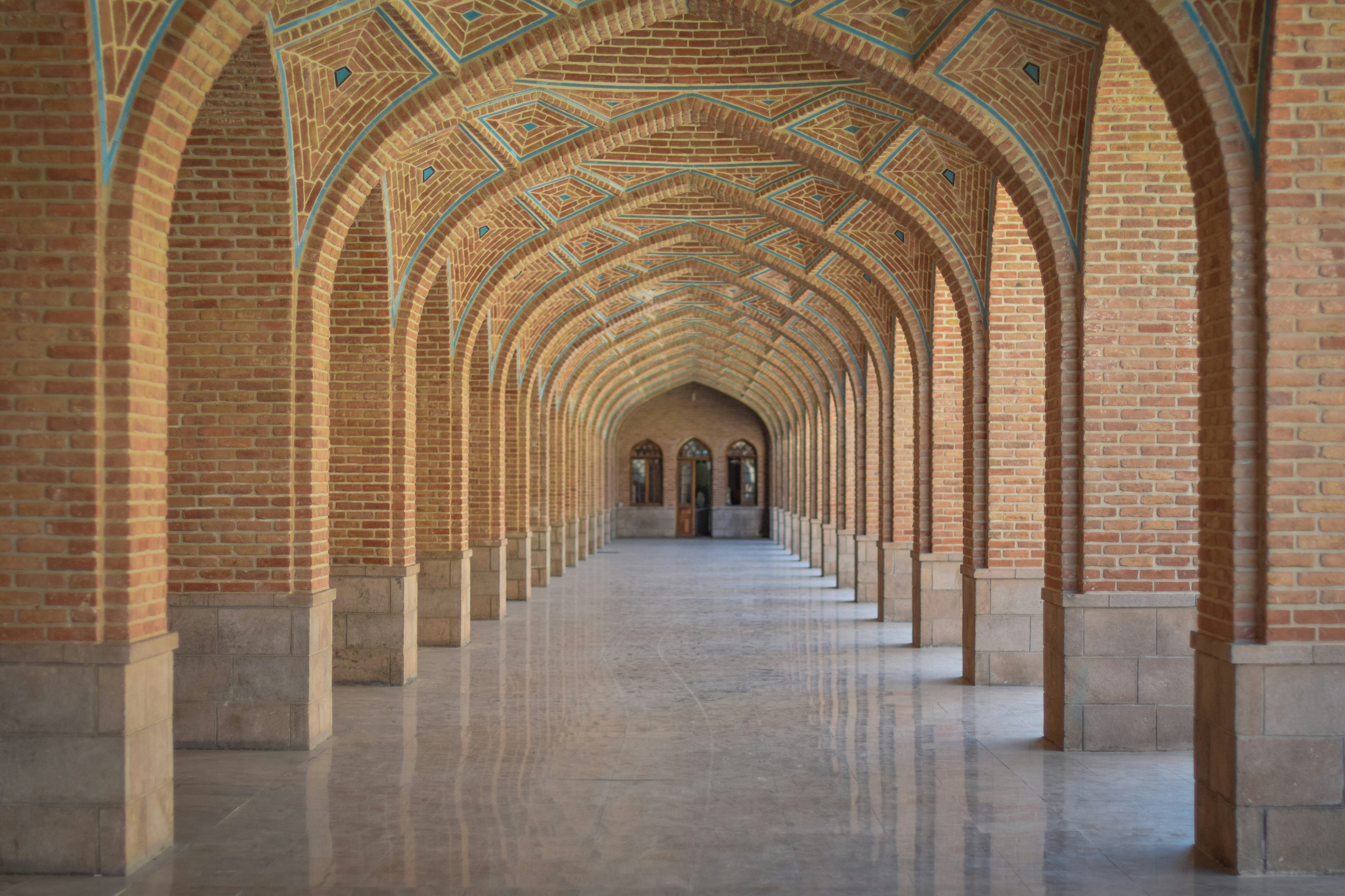 A long corridor with arched ceilings.
