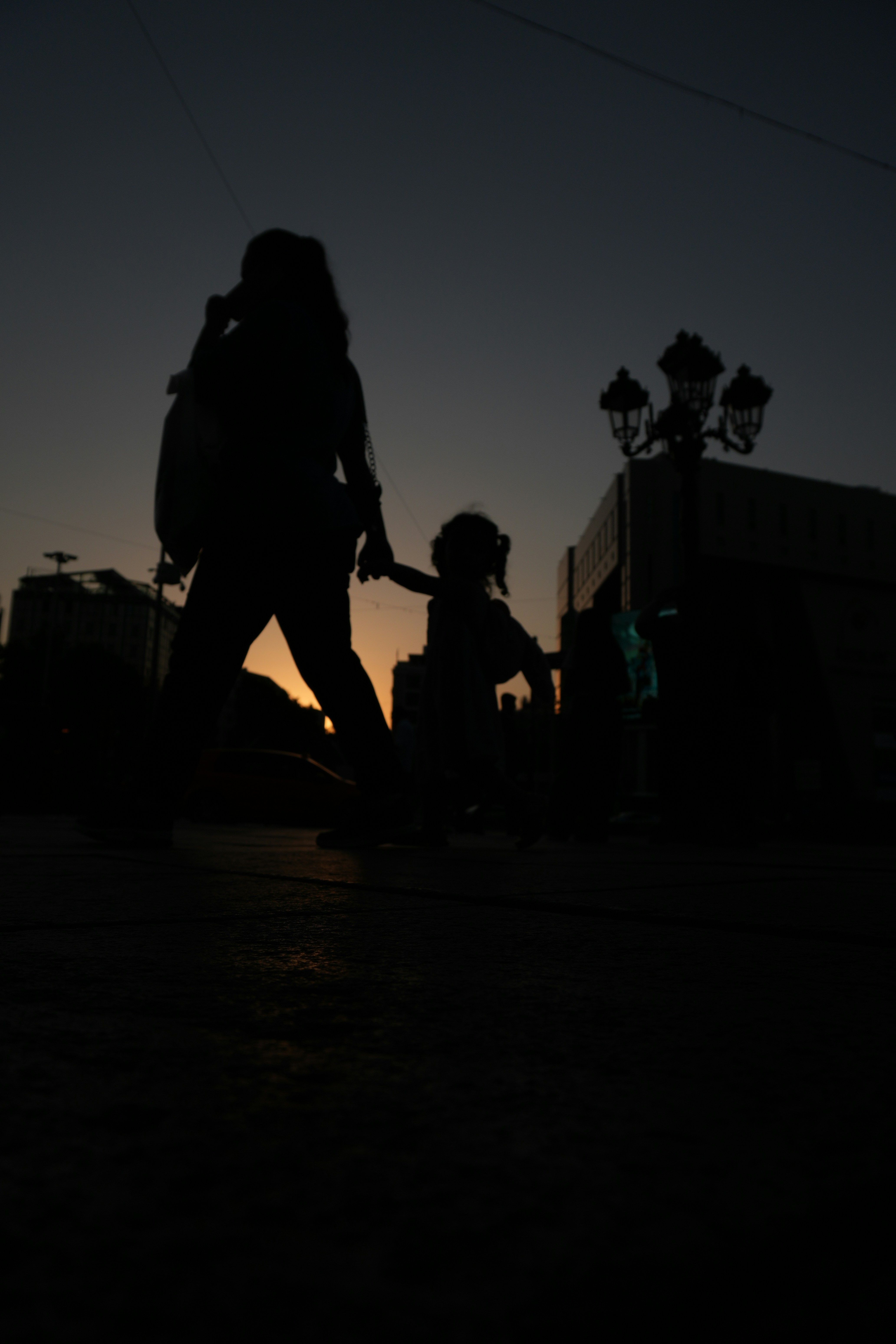 Evening Stroll: Shadows of Connection