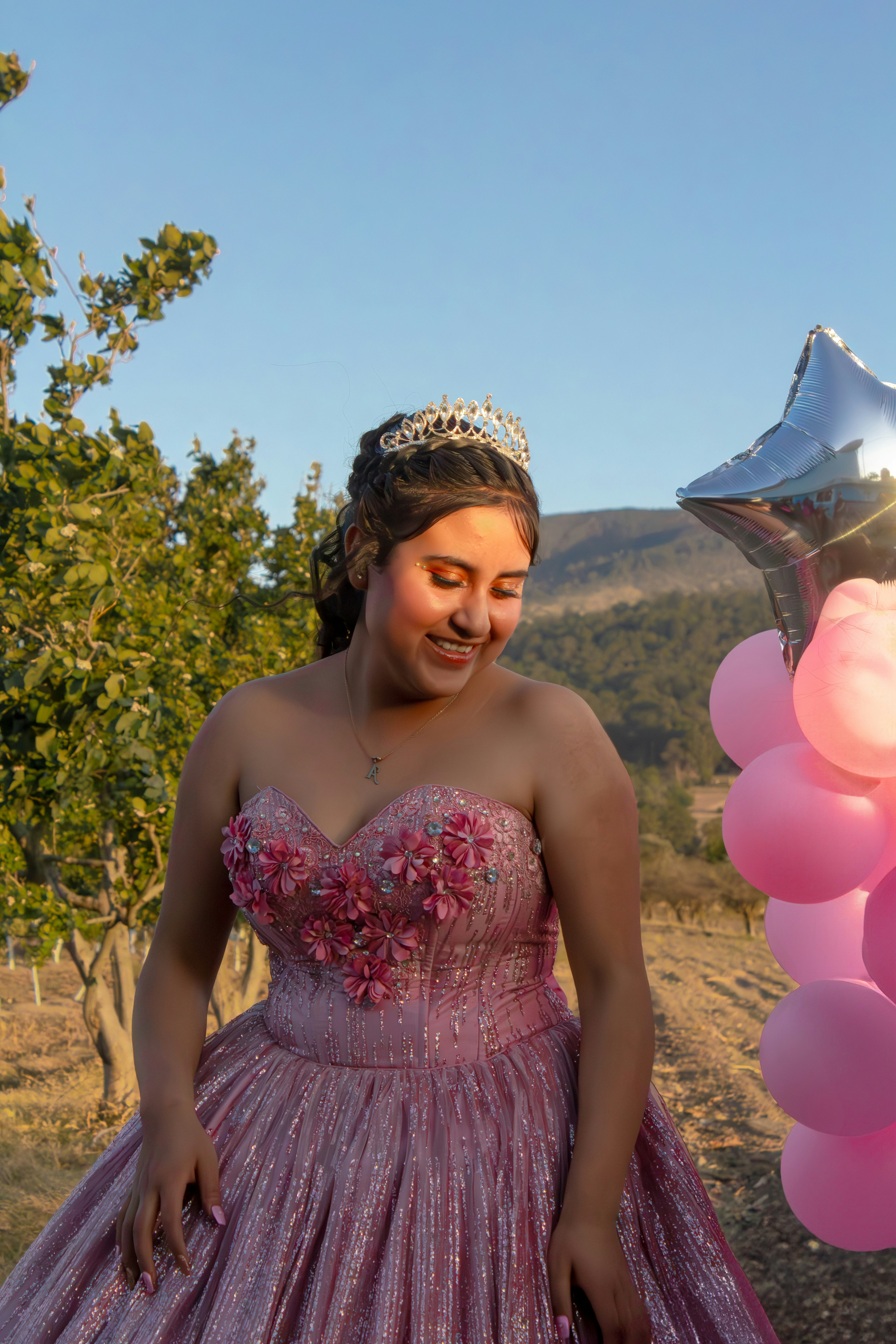 Golden Hour Princess in the Orchard: Pink Gown Beside Balloons