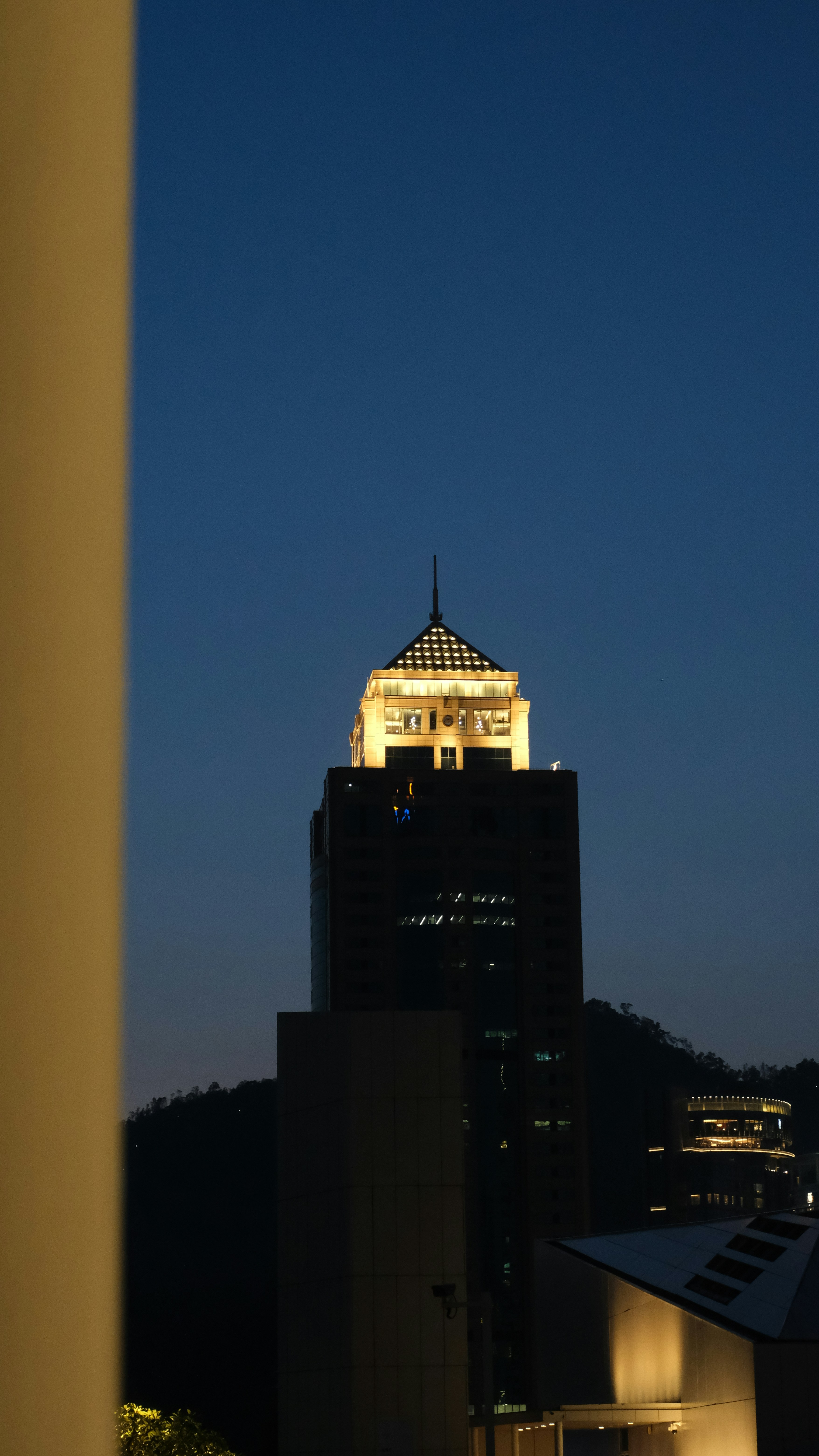Illuminated Skyline: A Beacon in the Twilight