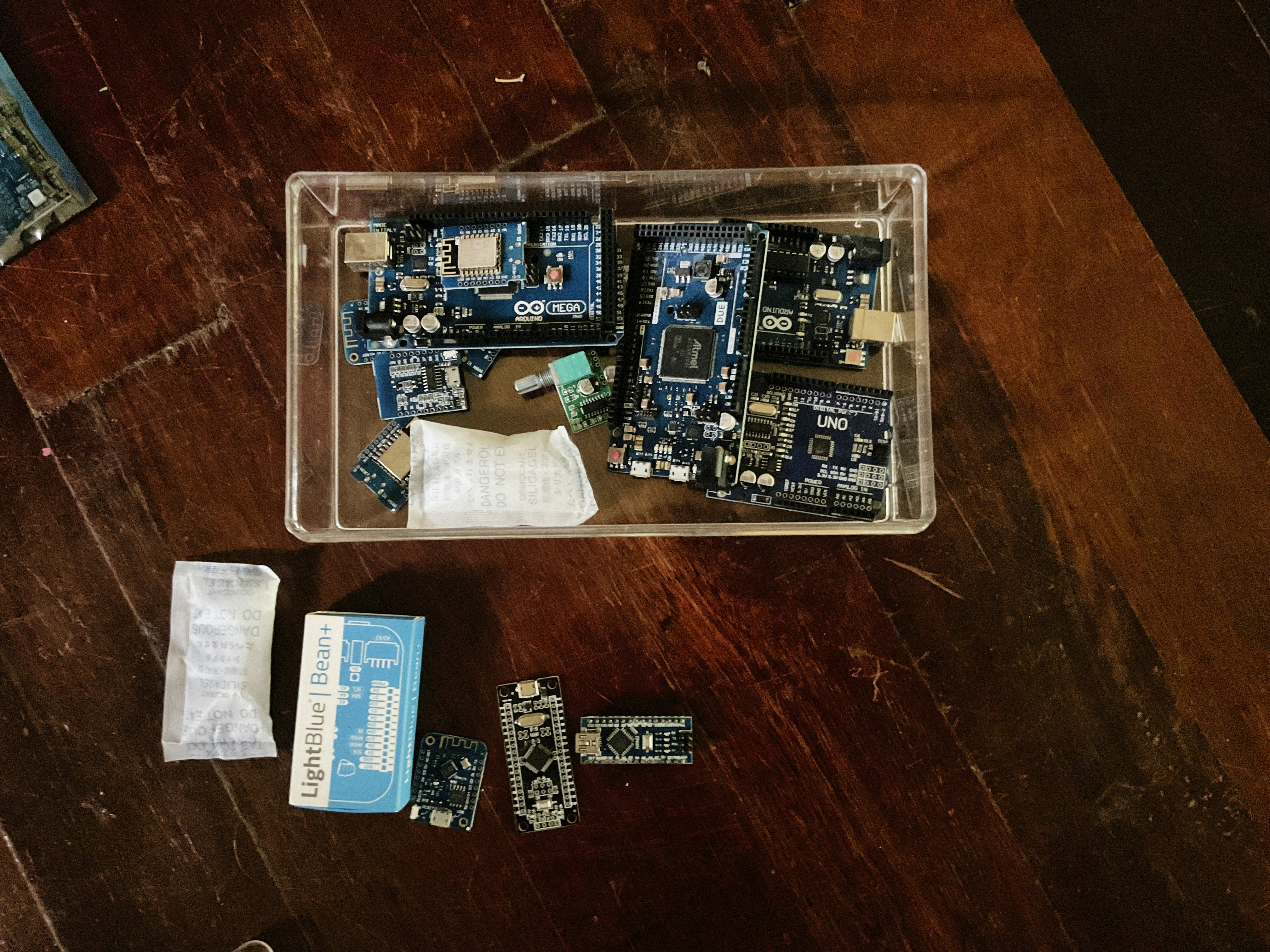Electronic circuit boards are organized in a container.