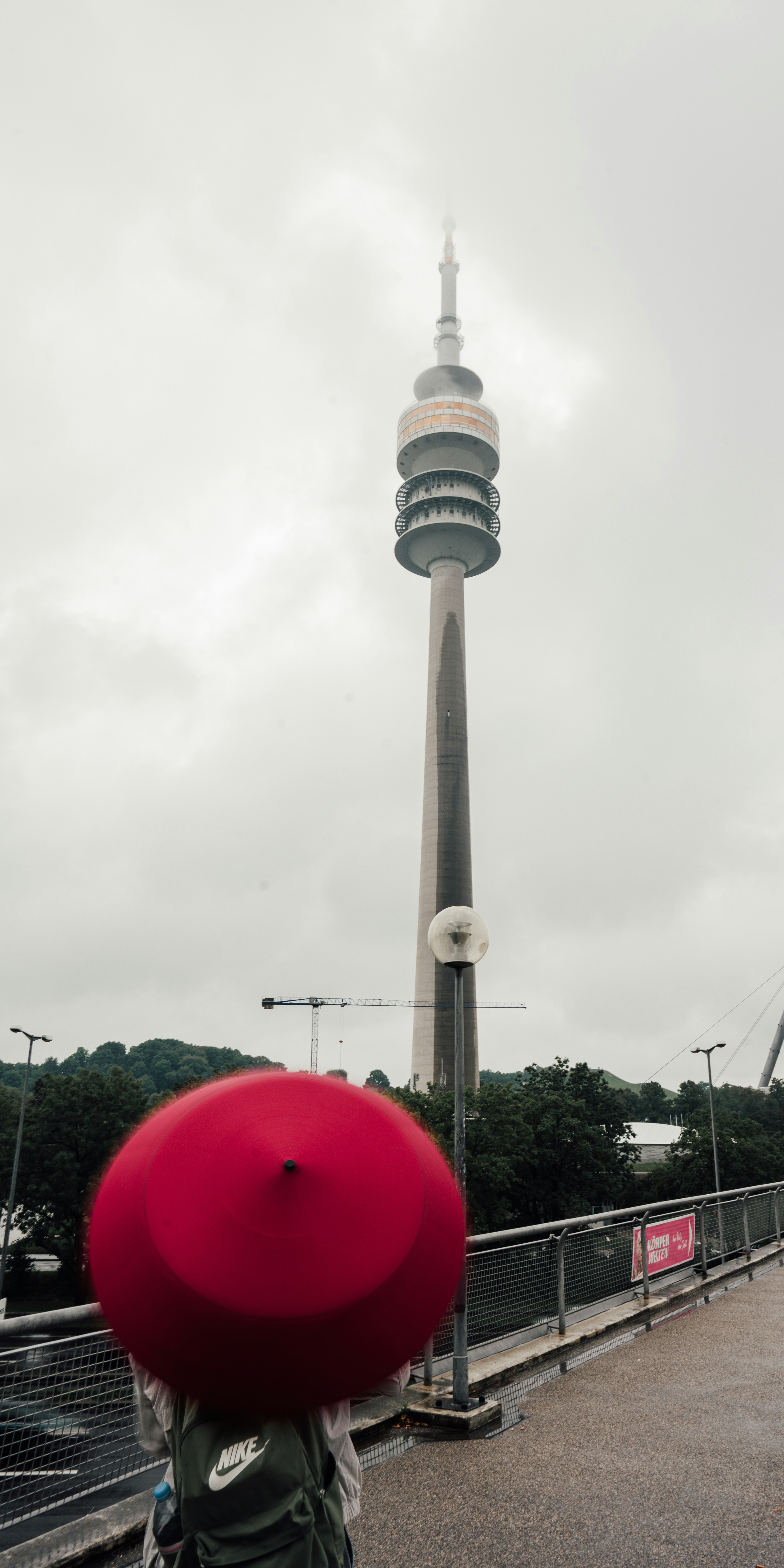 Urban Resilience: A Pop of Color Against Gloomy Skies