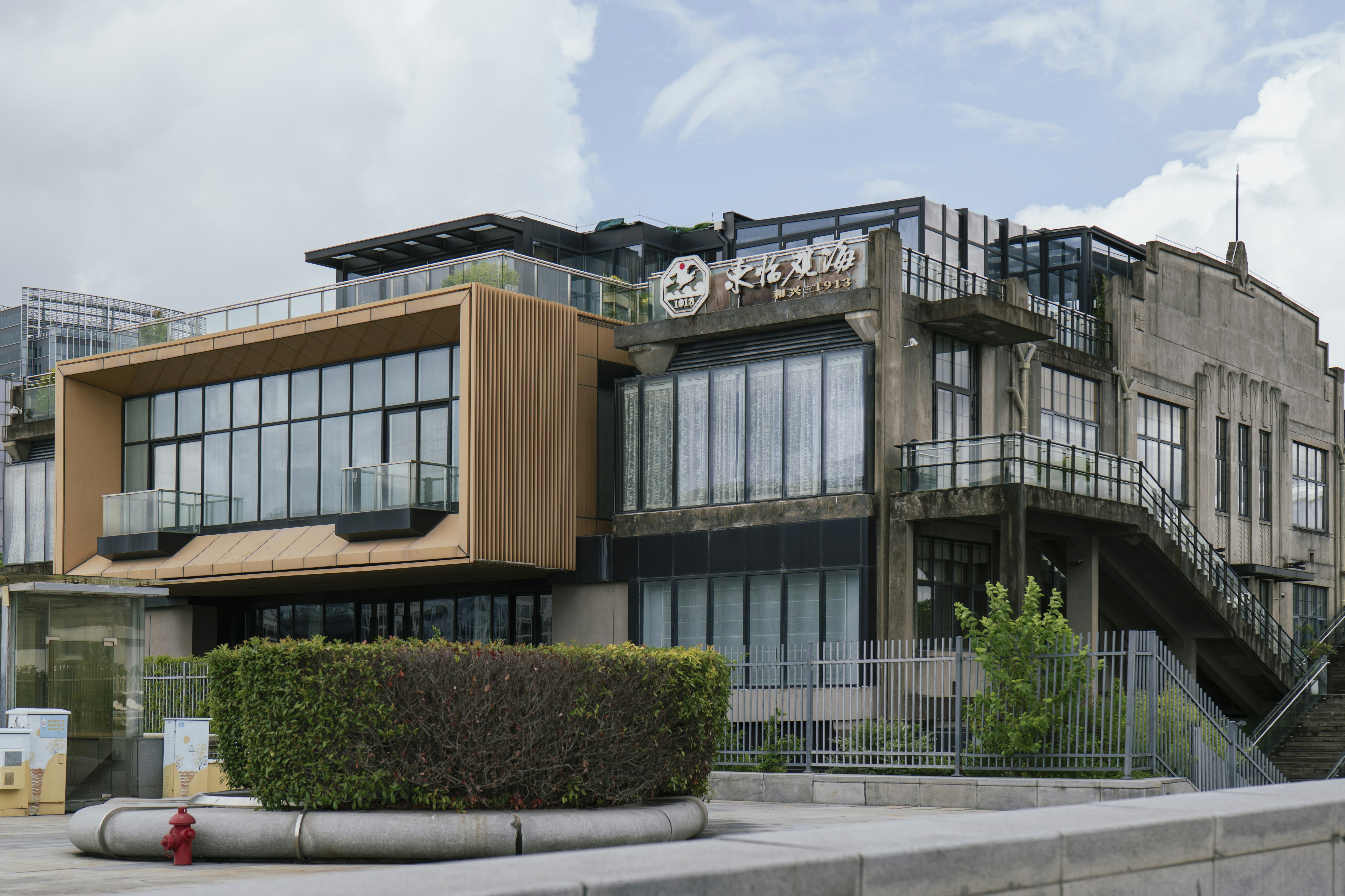 Orange Box Facade: A Modern Building with Glass Wings