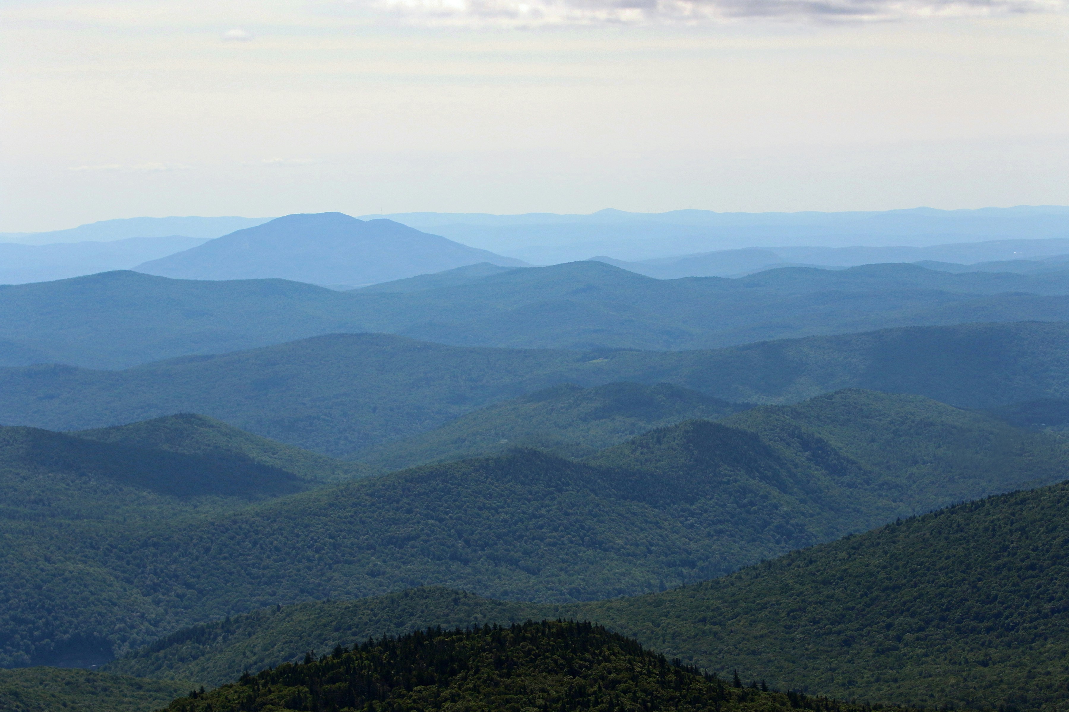 Hills and mountains fade into the distance.