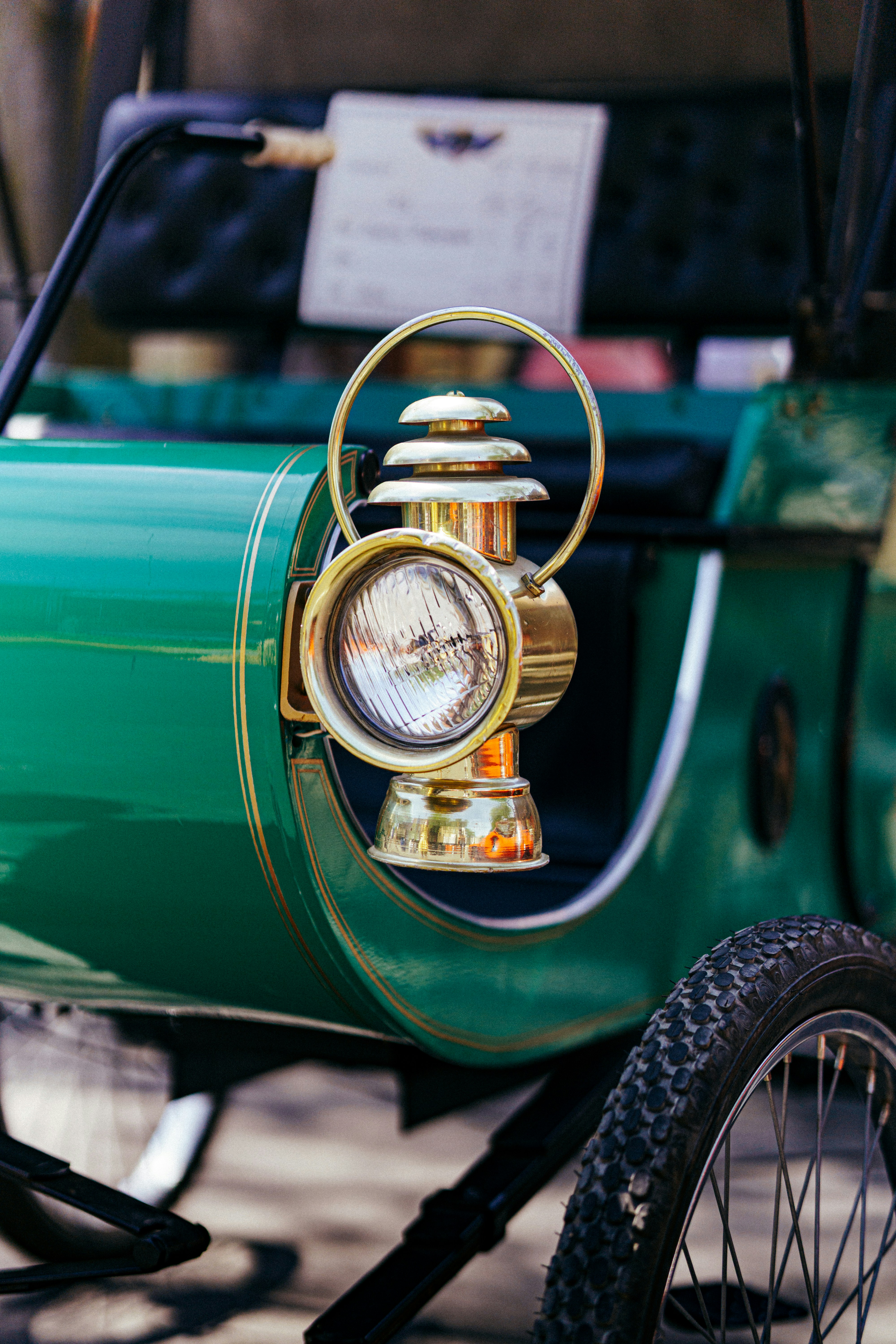 Brass Headlamp on a Verdant Vintage Car